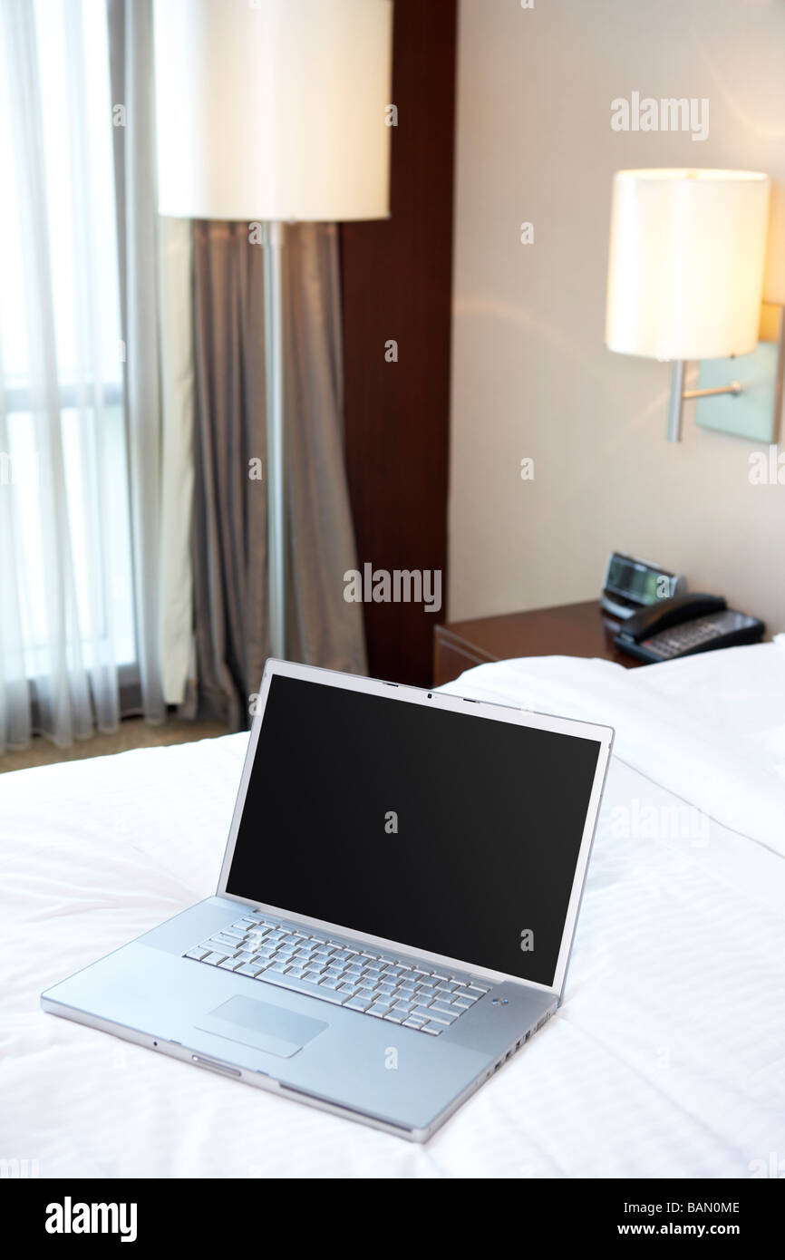 Laptop in a hotel room Stock Photo - Alamy