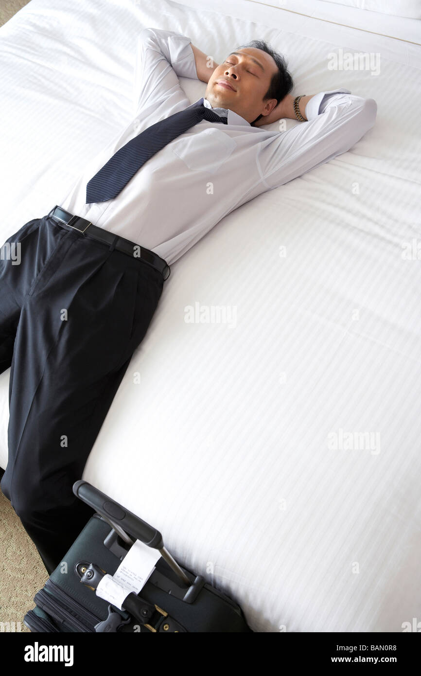 Sleeping man in bed full body hi-res stock photography and images - Alamy