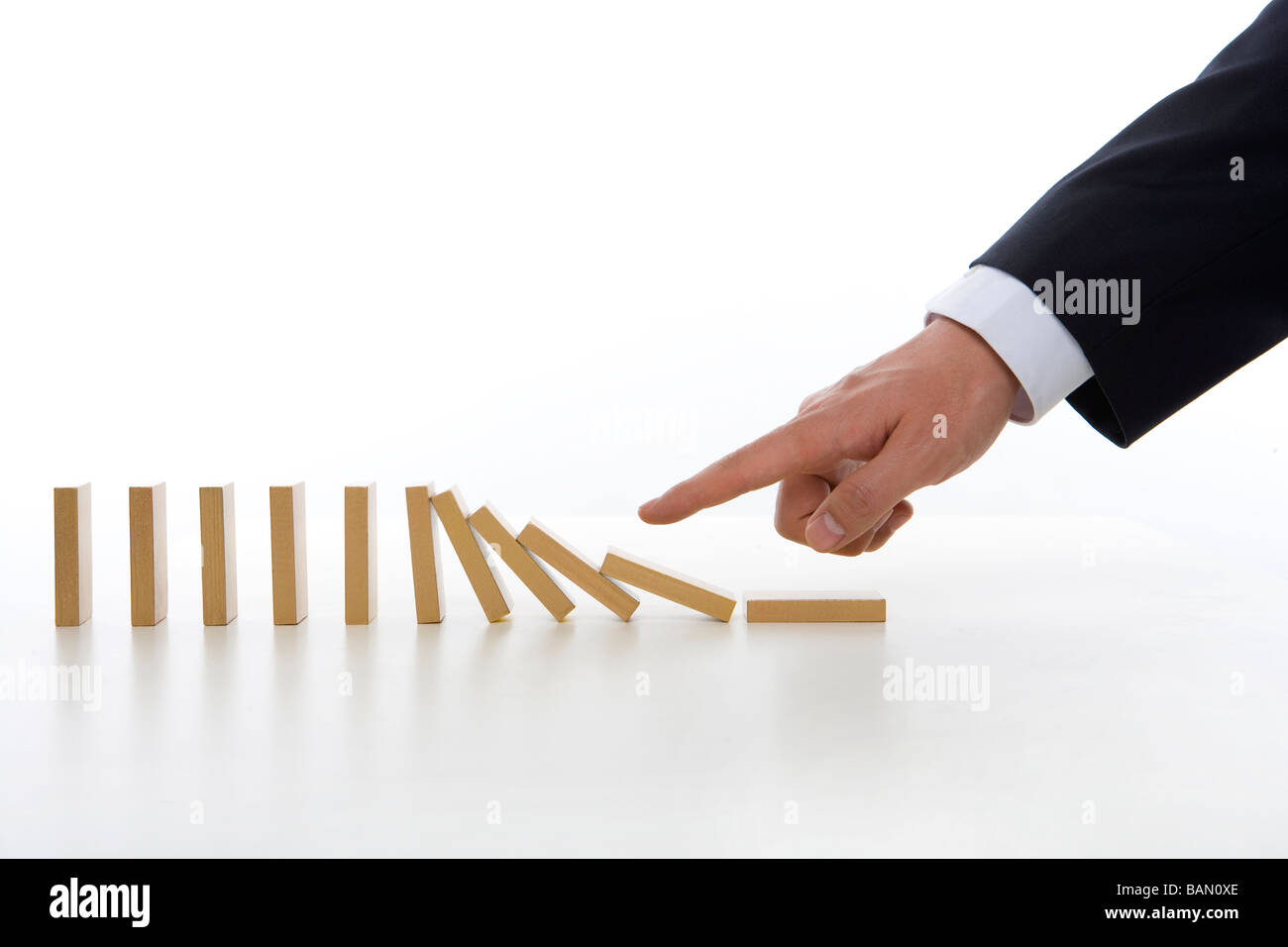The domino effect Stock Photo - Alamy