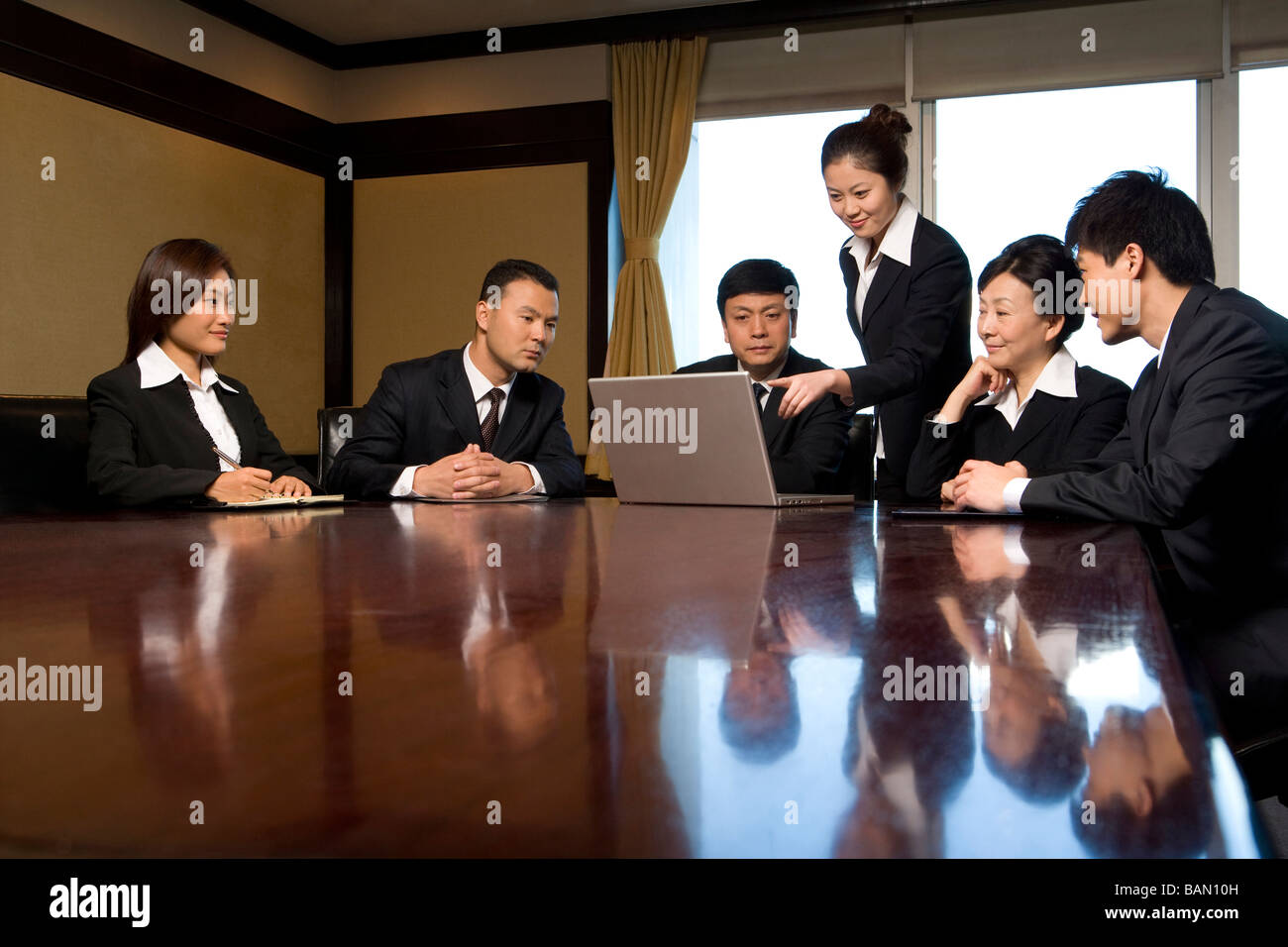 Corporate Team in the Boardroom Stock Photo - Alamy