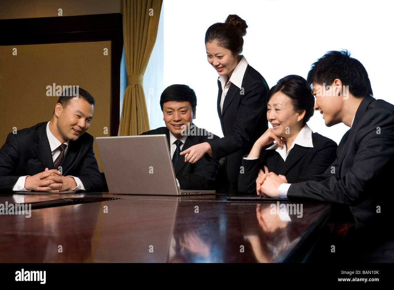 Corporate Team in the Boardroom Stock Photo - Alamy