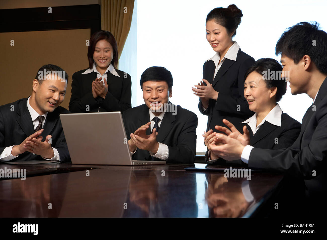 Corporate Team in the Boardroom Stock Photo - Alamy