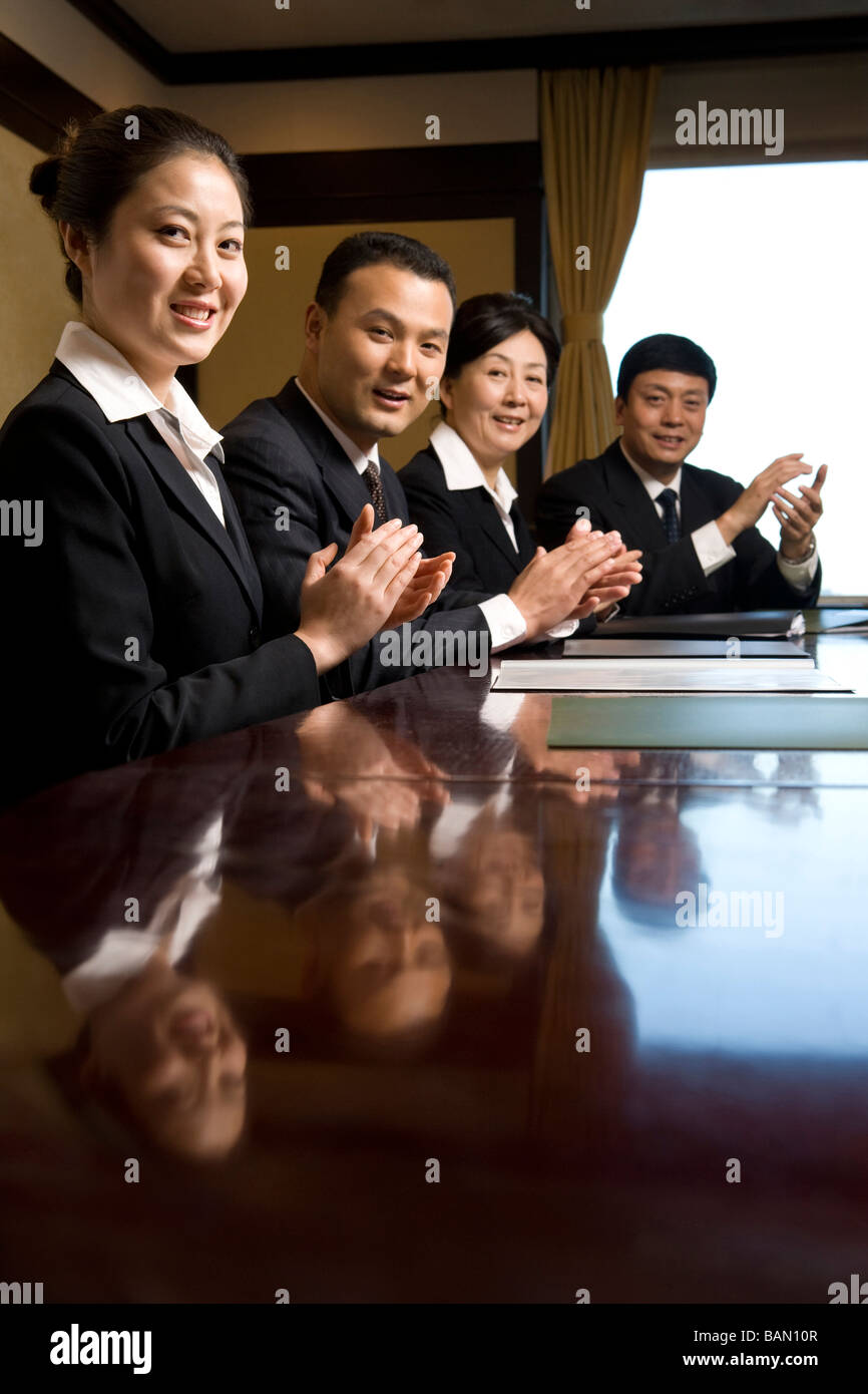 Corporate Team in the Boardroom Stock Photo - Alamy