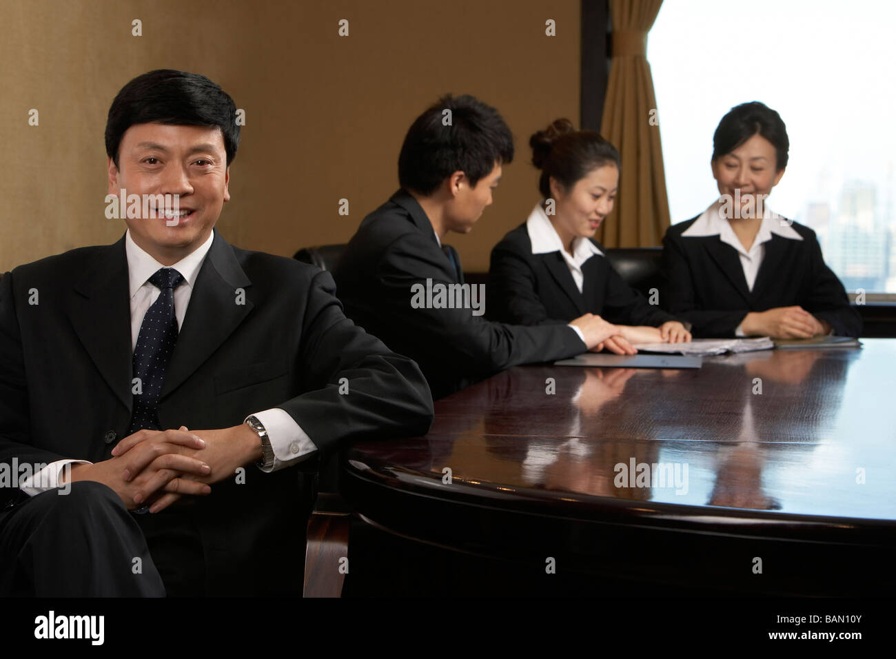 Portrait of Leader and Team in the Boardroom Stock Photo - Alamy