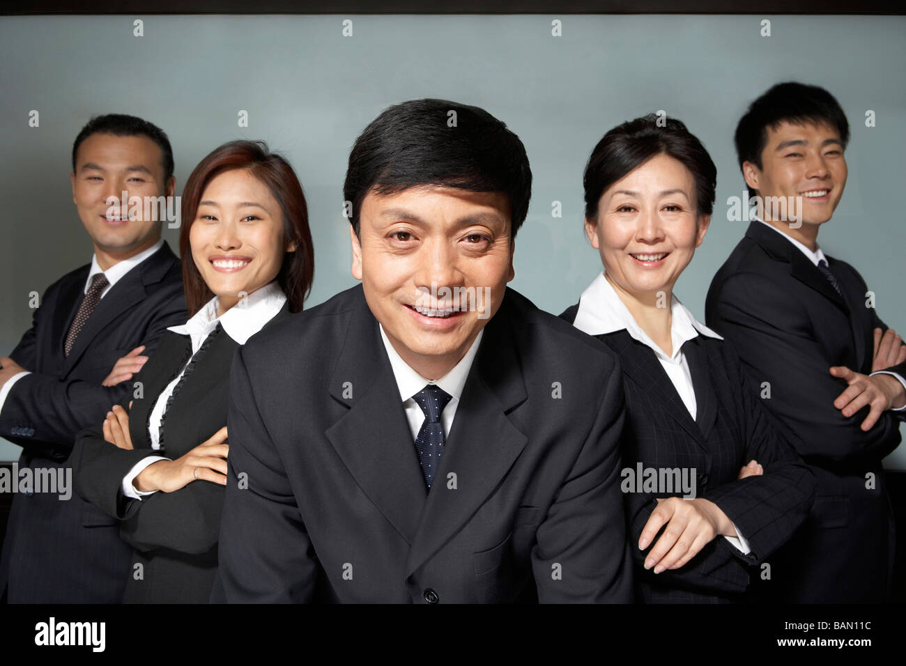 Corporate Team in the Boardroom Stock Photo - Alamy