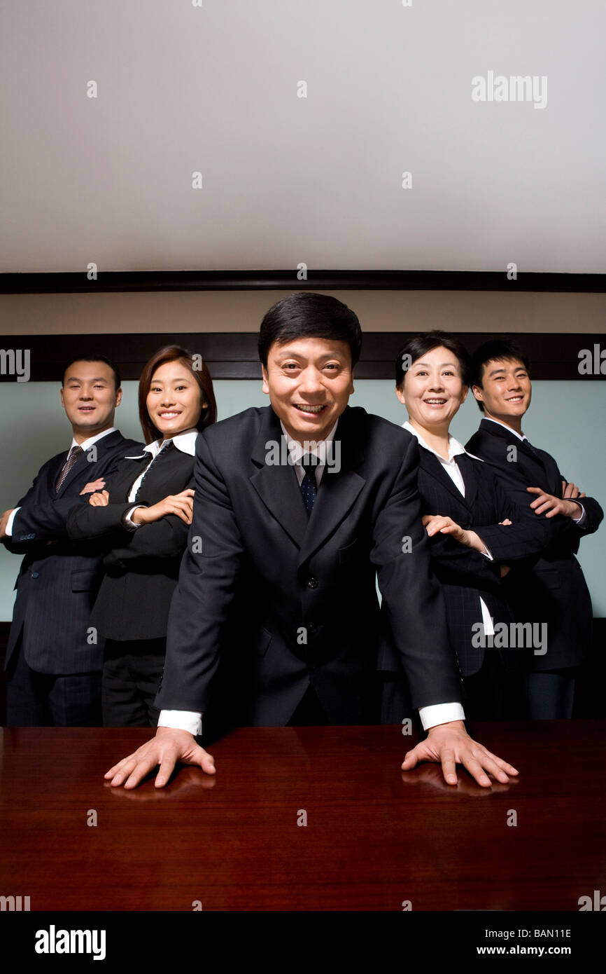 Corporate Team in the Boardroom Stock Photo - Alamy