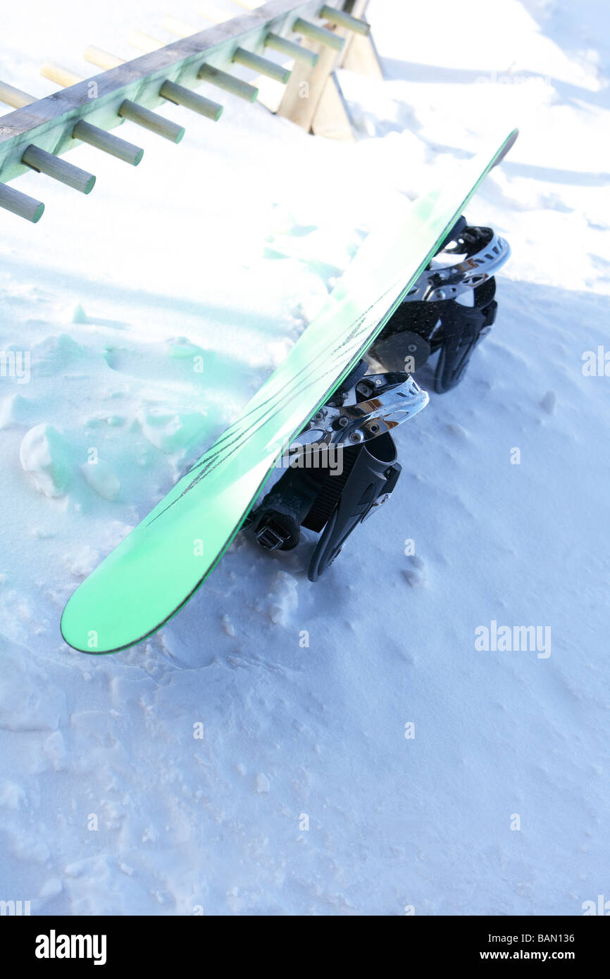 Snowboard in the snow Stock Photo - Alamy