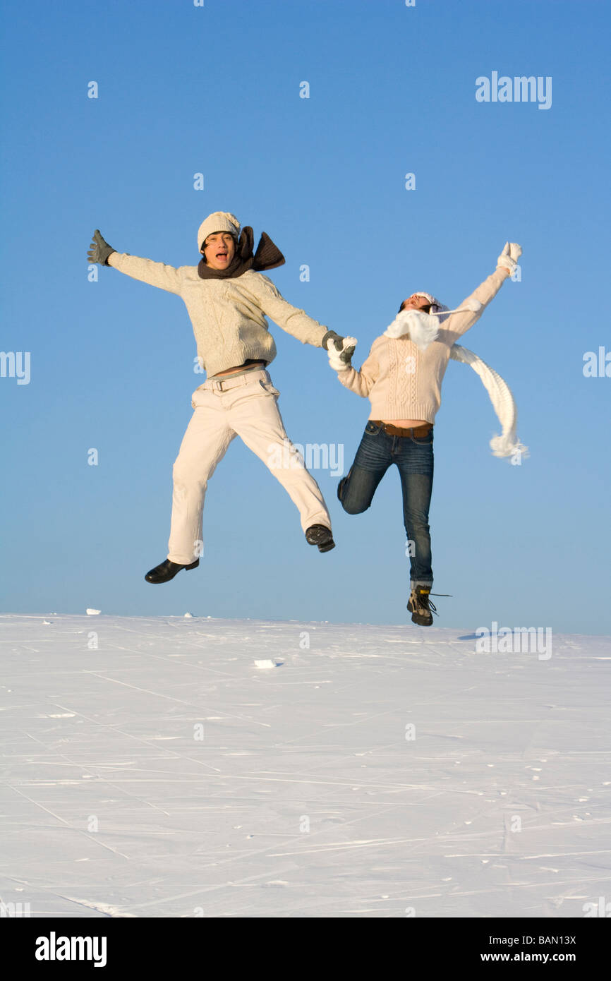Back view two young women jumping in hi-res stock photography and ...