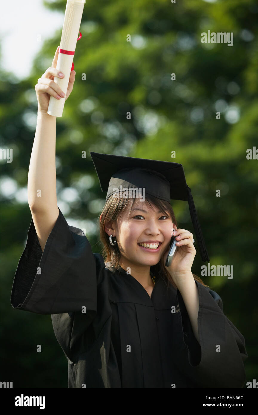 Young woman graduating Stock Photo - Alamy