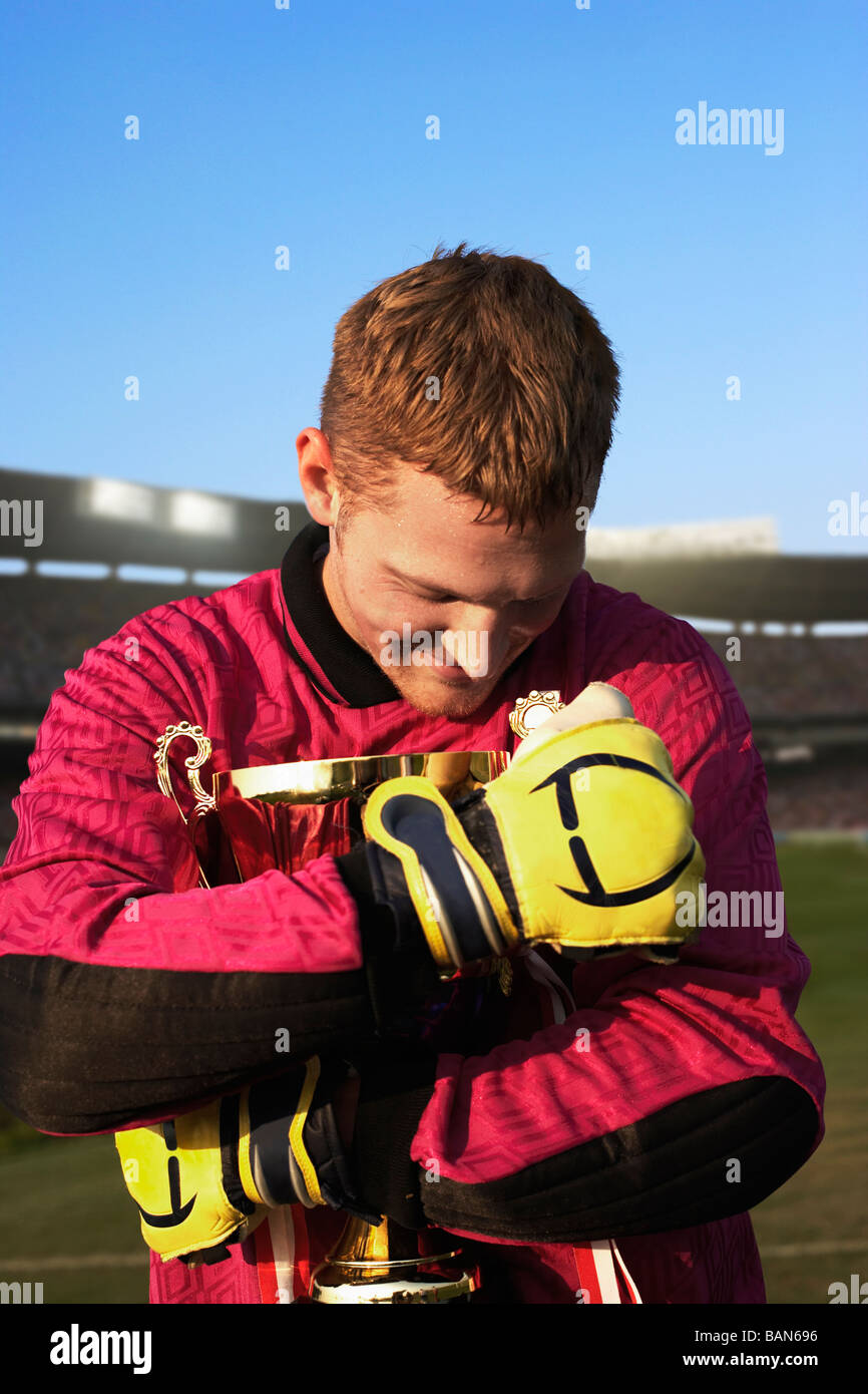 Hugging trophy hi-res stock photography and images - Alamy