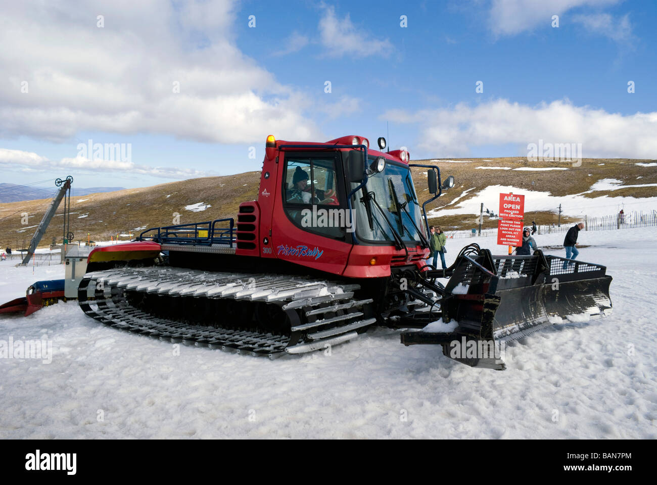 Piste basher machine working on Cairngorm Mountain, outside the ...