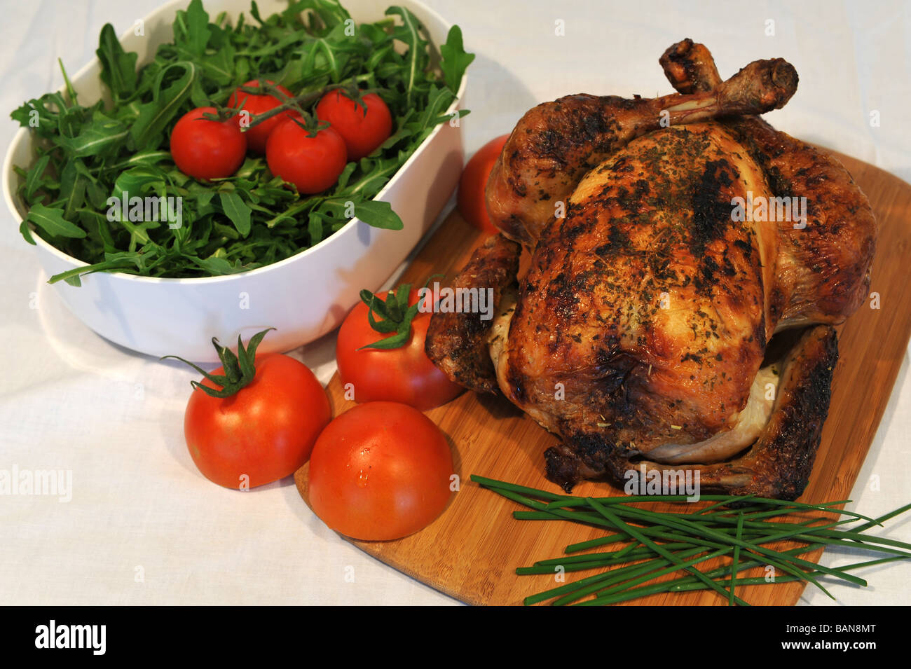 Roast chicken dinner served with a selection of salad items Stock Photo ...