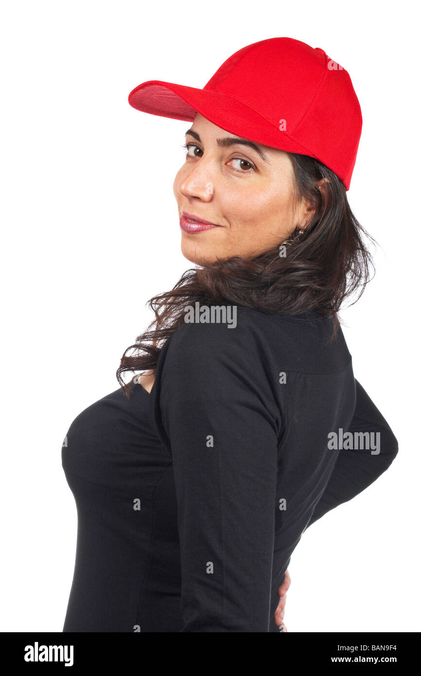 Smiling casual woman with a red cap on white background Stock Photo - Alamy