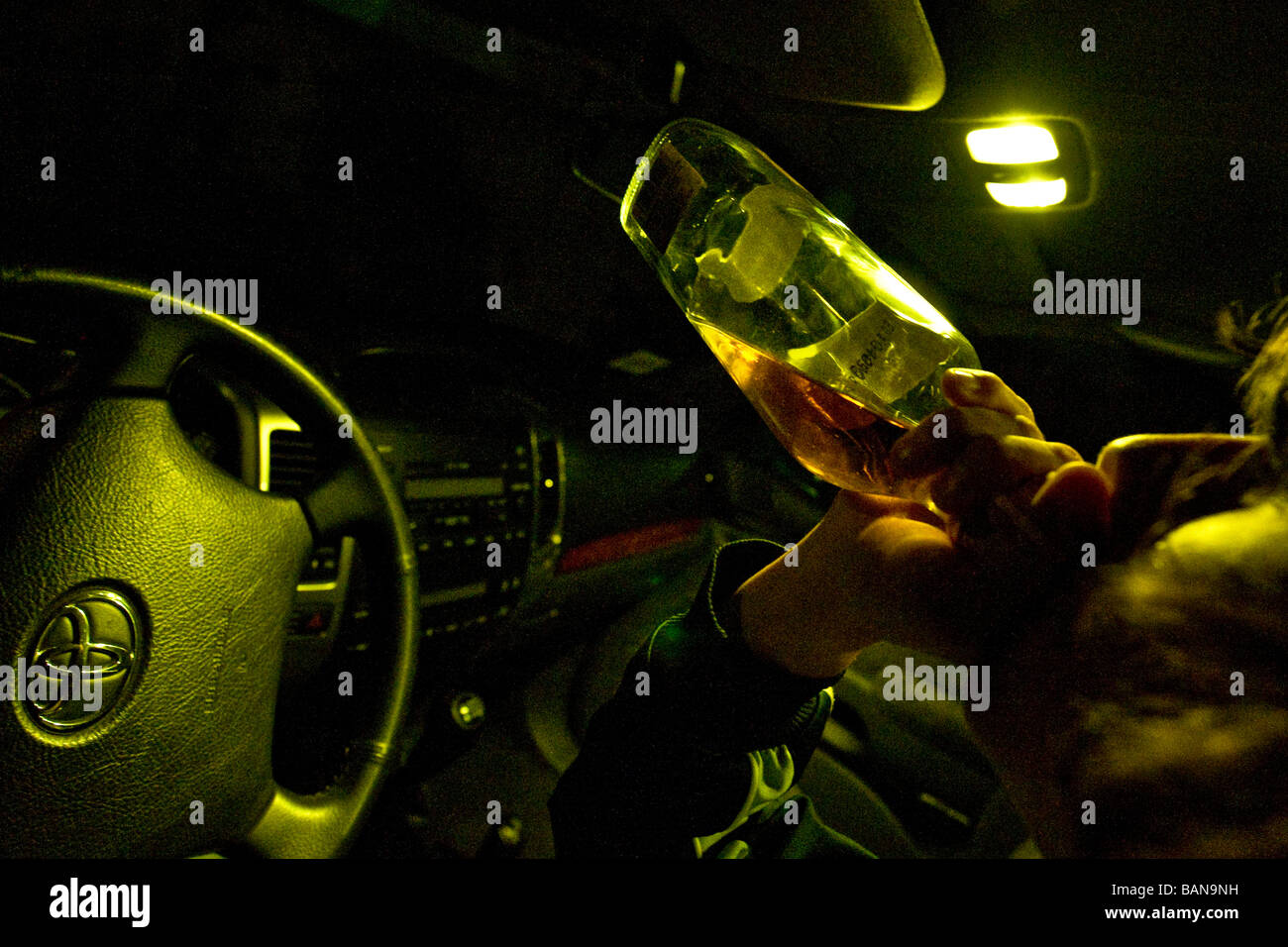 alcoholism in the car Stock Photo - Alamy