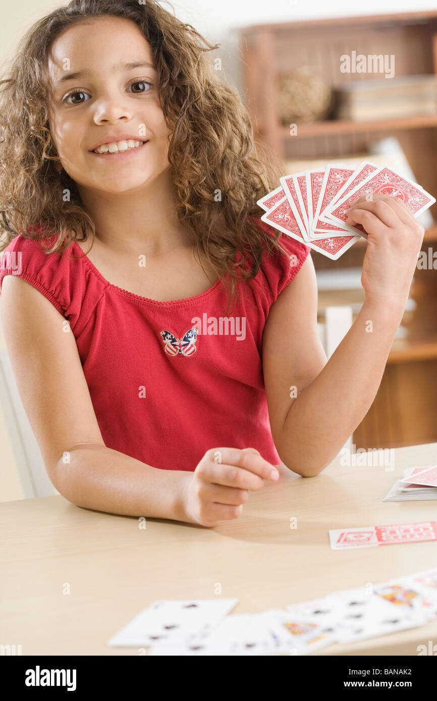 Girl with cards hi-res stock photography and images - Alamy
