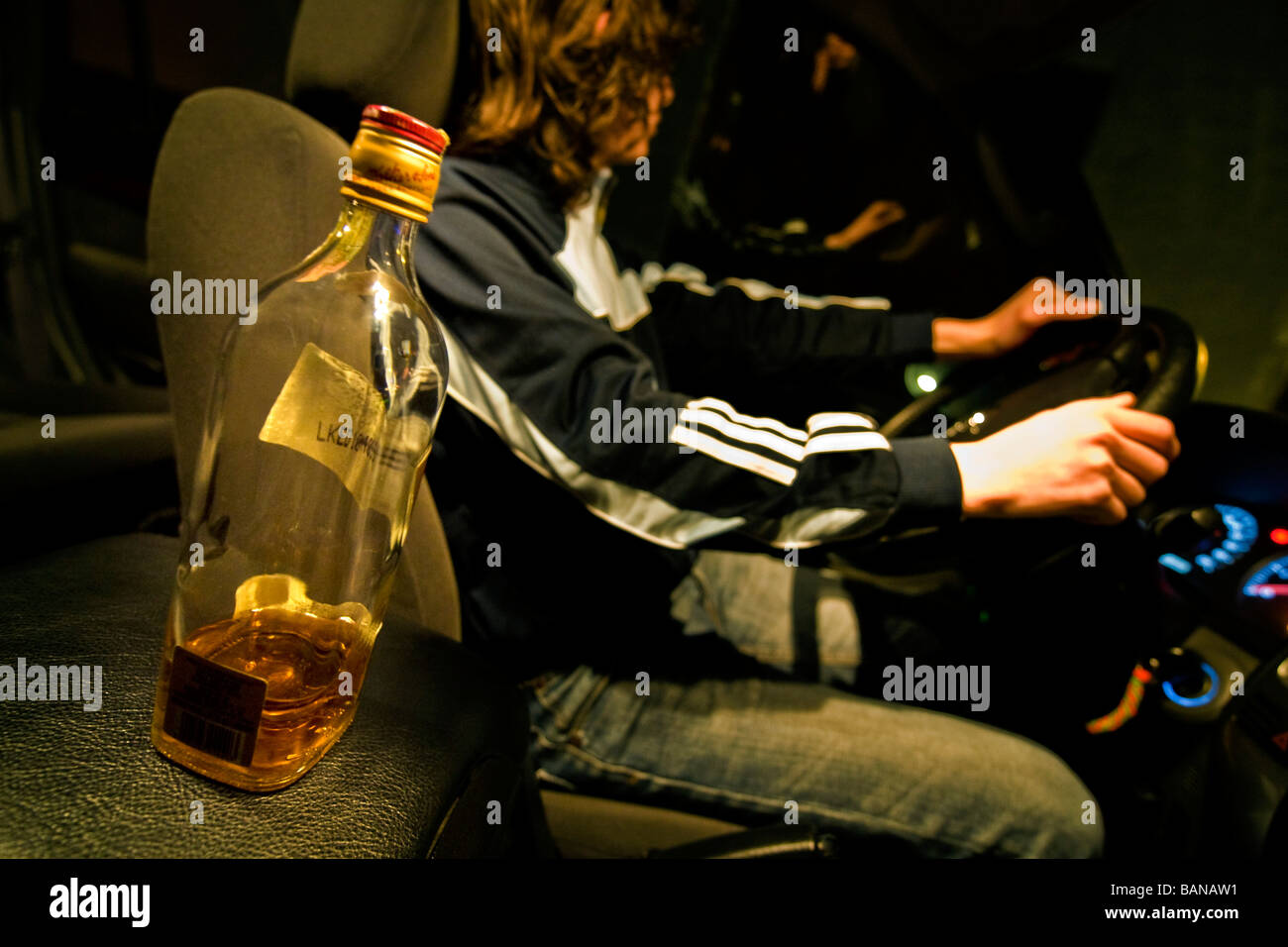 alcoholism in the car Stock Photo - Alamy