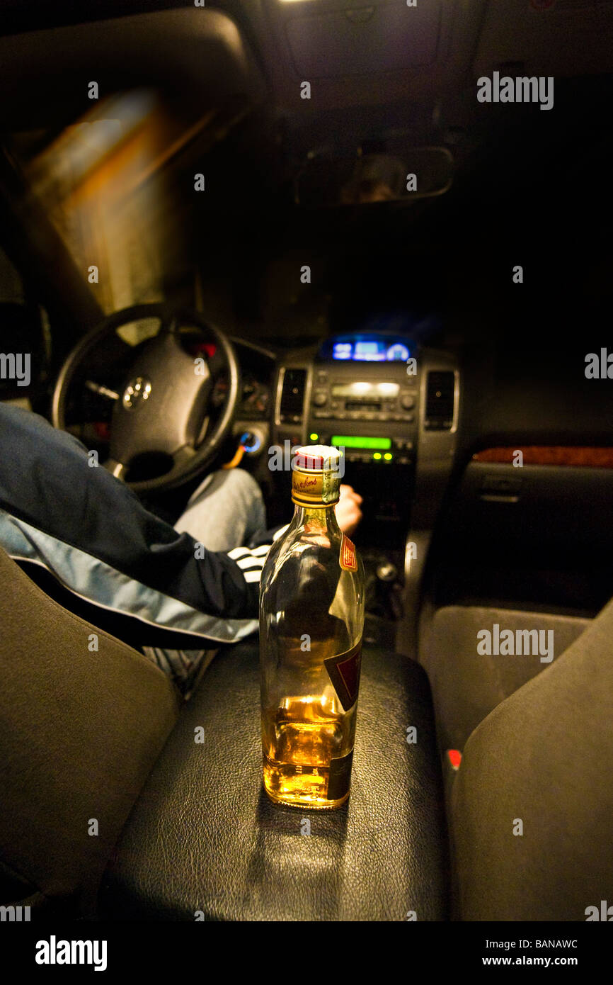 alcoholism in the car Stock Photo - Alamy