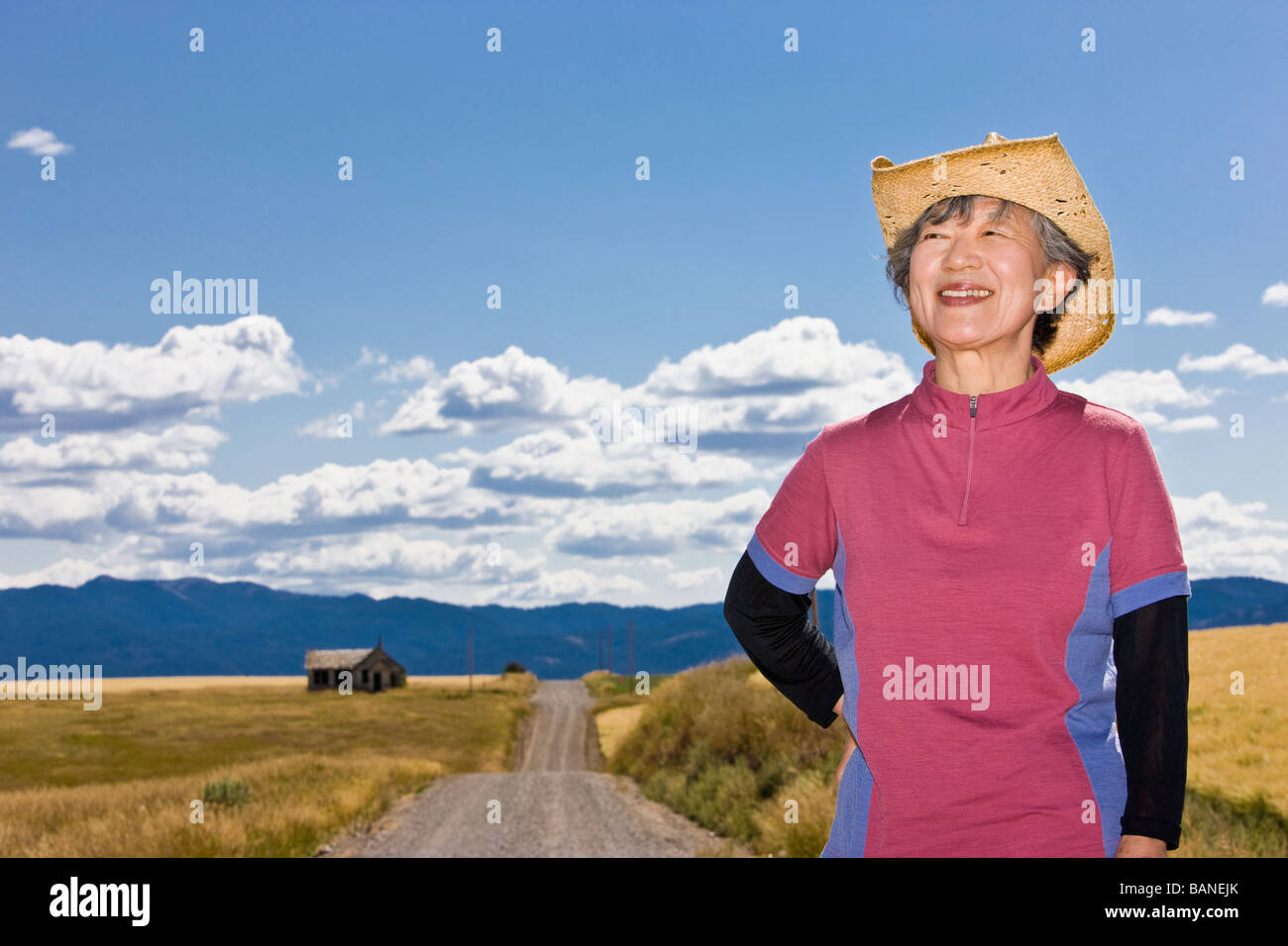 Senior Japanese woman on dirt road in countryside Stock Photo - Alamy
