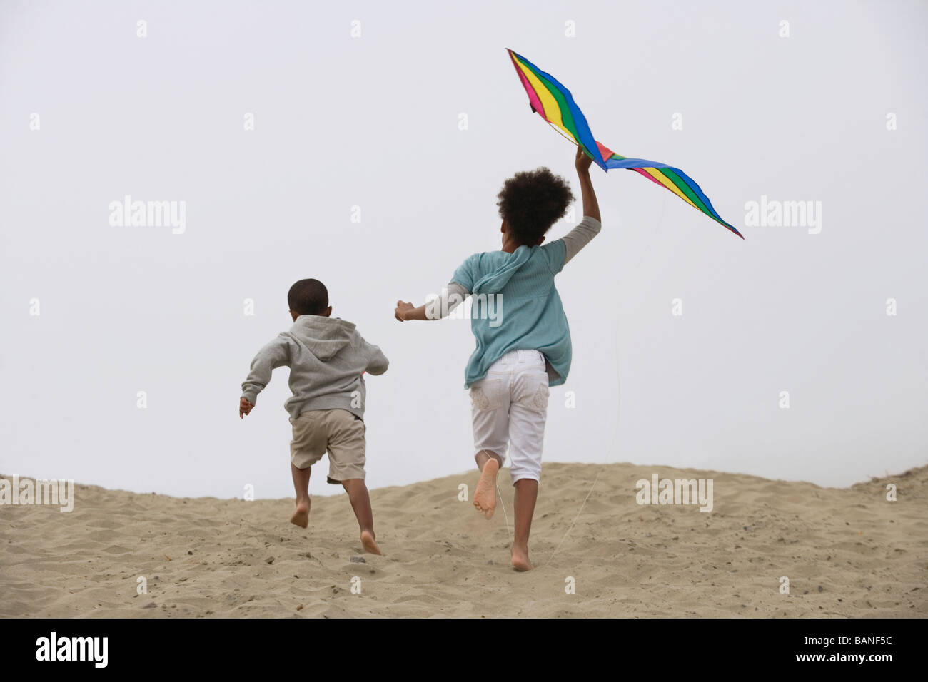 Children chasing running hi-res stock photography and images - Alamy