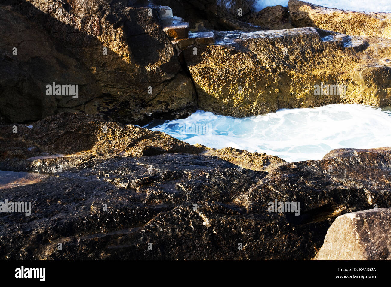 Waves surf splashing against rocks hi-res stock photography and images ...