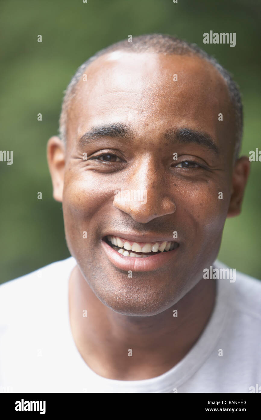 Close up of African man smiling Stock Photo - Alamy