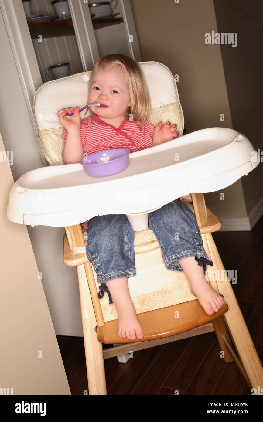 Child in a high chair hi-res stock photography and images - Alamy