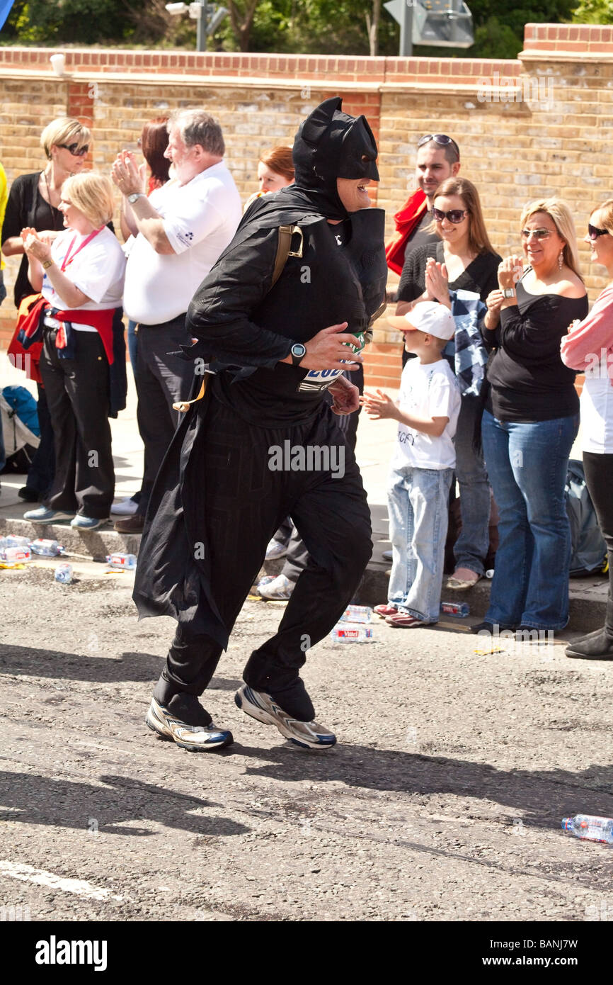 Batman fancy dress running the Flora London Marathon 2009 at Mudchute ...