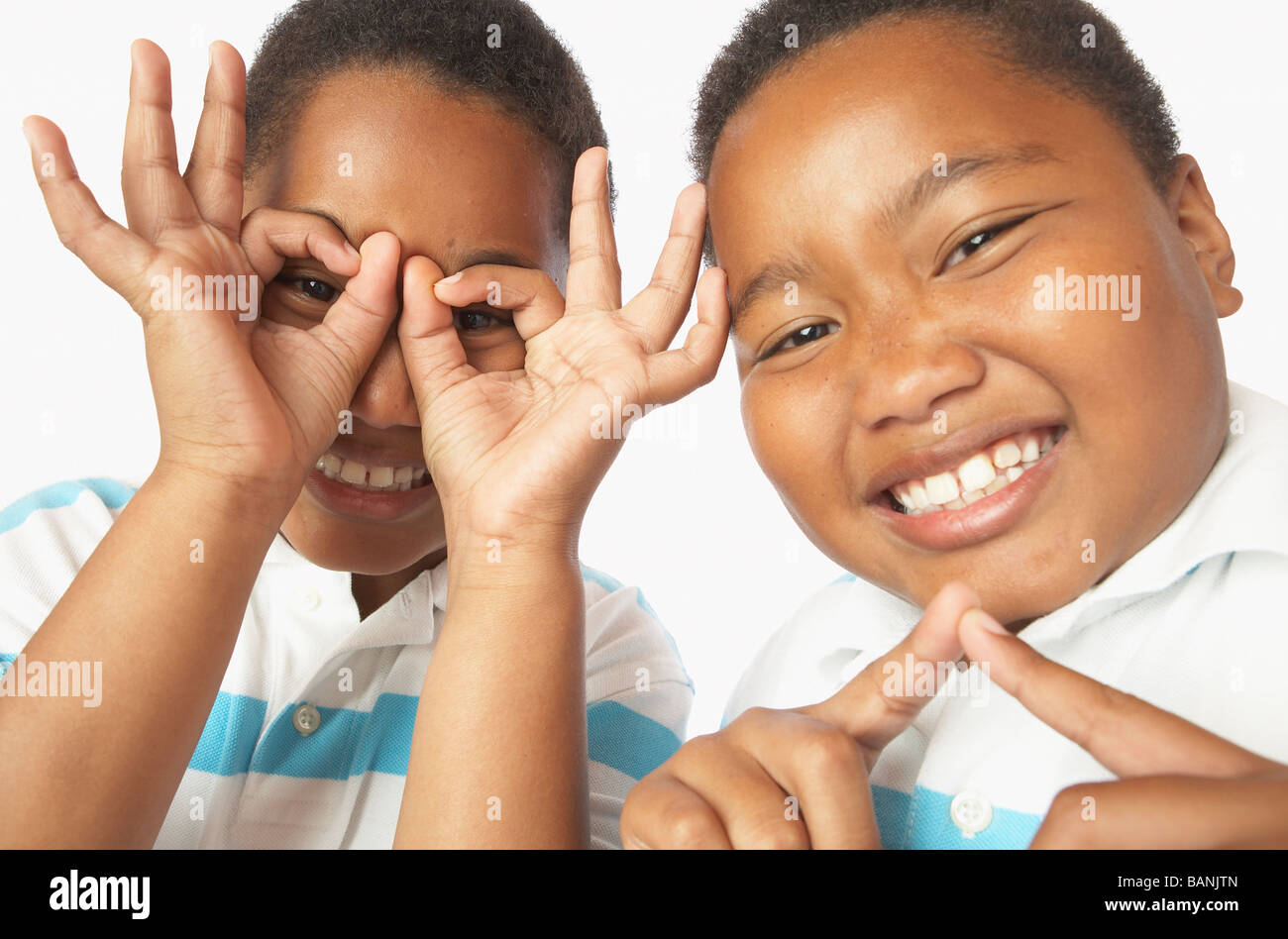 Young African twin brothers being silly Stock Photo - Alamy