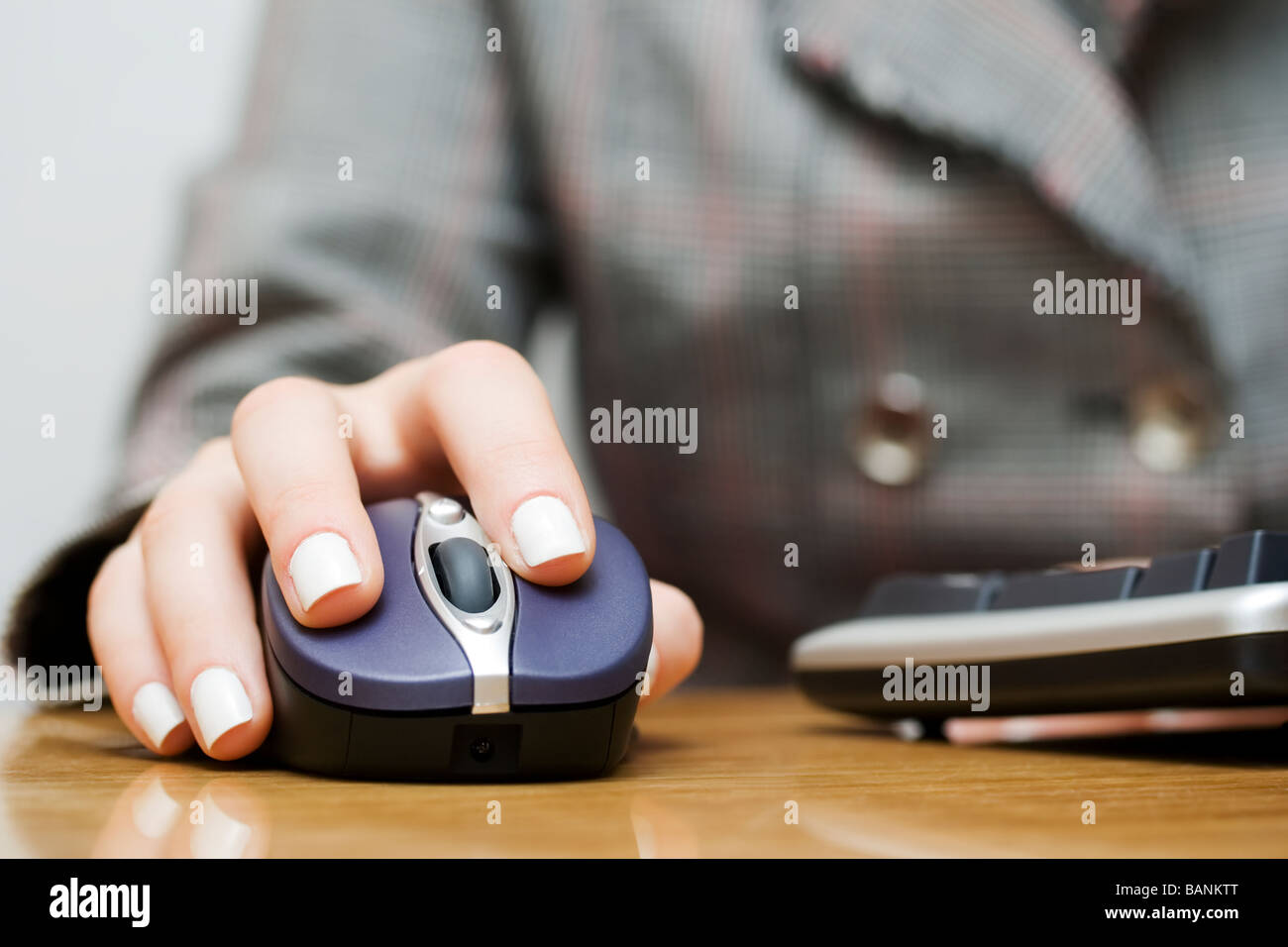 Female hand holding the wireless computer mouse Stock Photo - Alamy