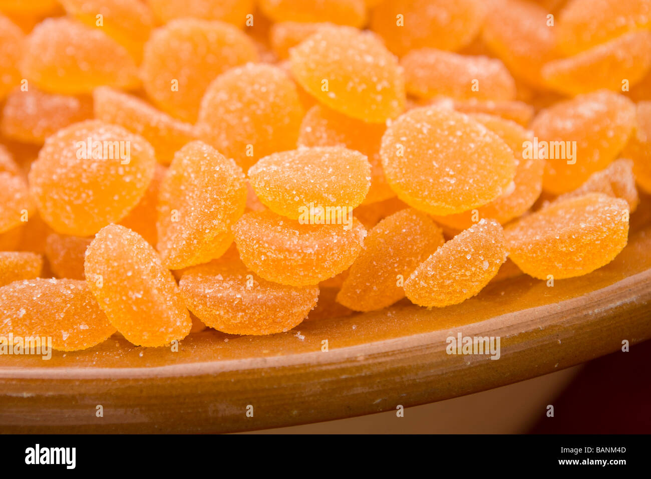 Orange coloured sweets hi-res stock photography and images - Alamy