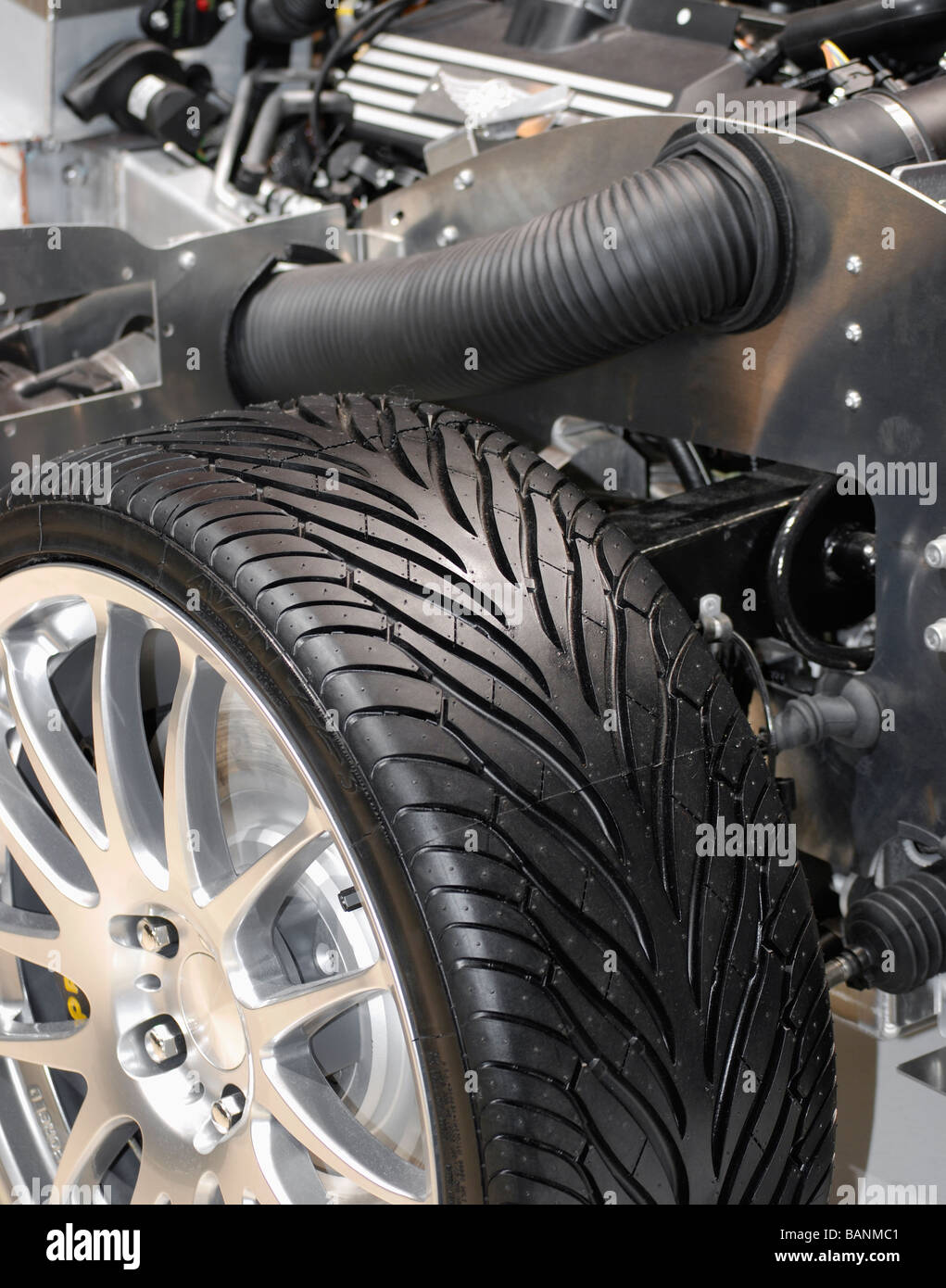 Closeup of the rear wheel and engine area of a Morgan car Stock Photo ...