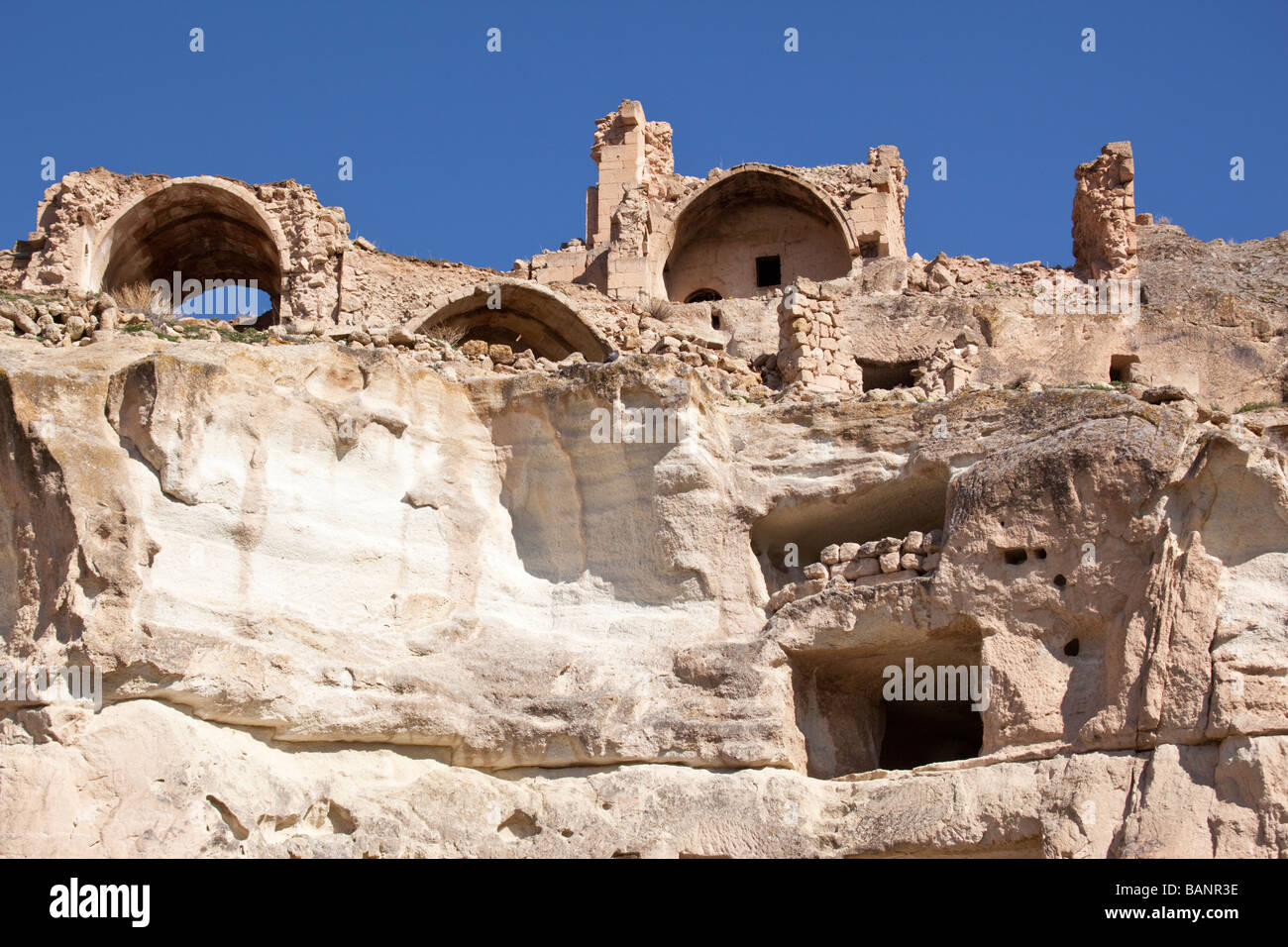 Cave homes and fairy chimneys at Goreme Cappadocia Turkey Stock Photo ...