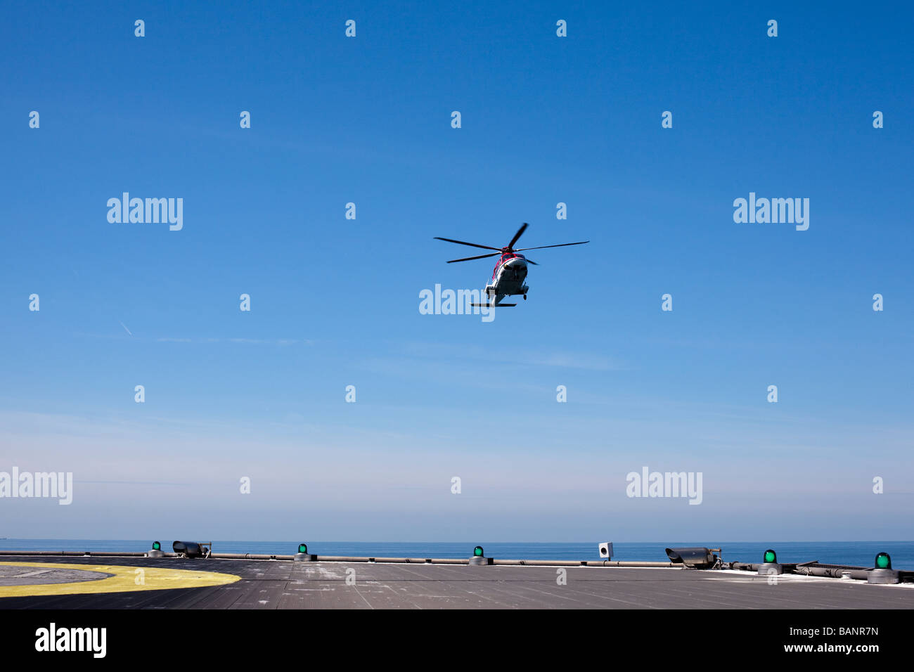 Helicopter coming in to land Stock Photo - Alamy