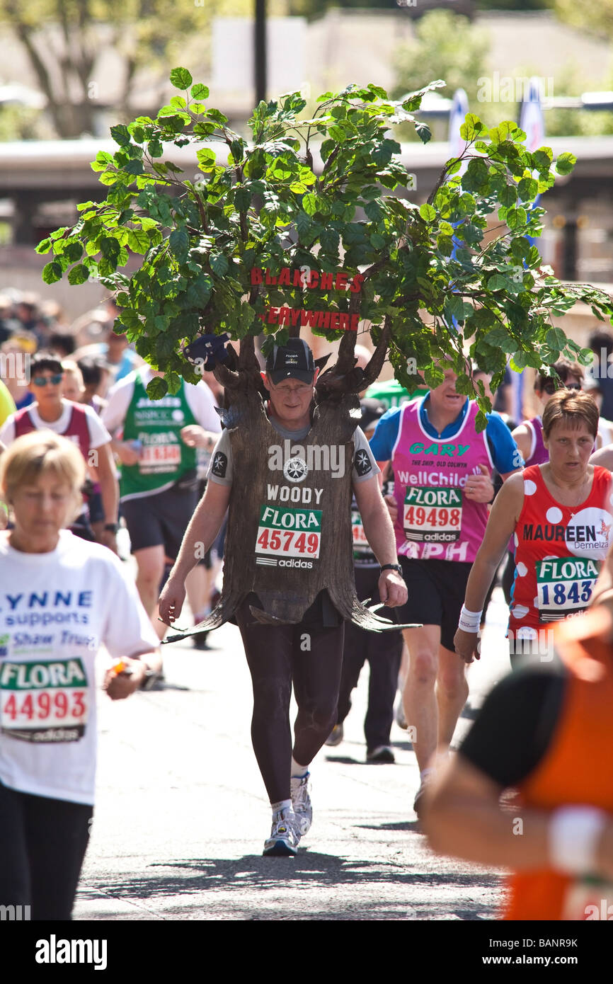 Fancy dress runner, dressed as a tree on the Flora London Marathon 2009 ...