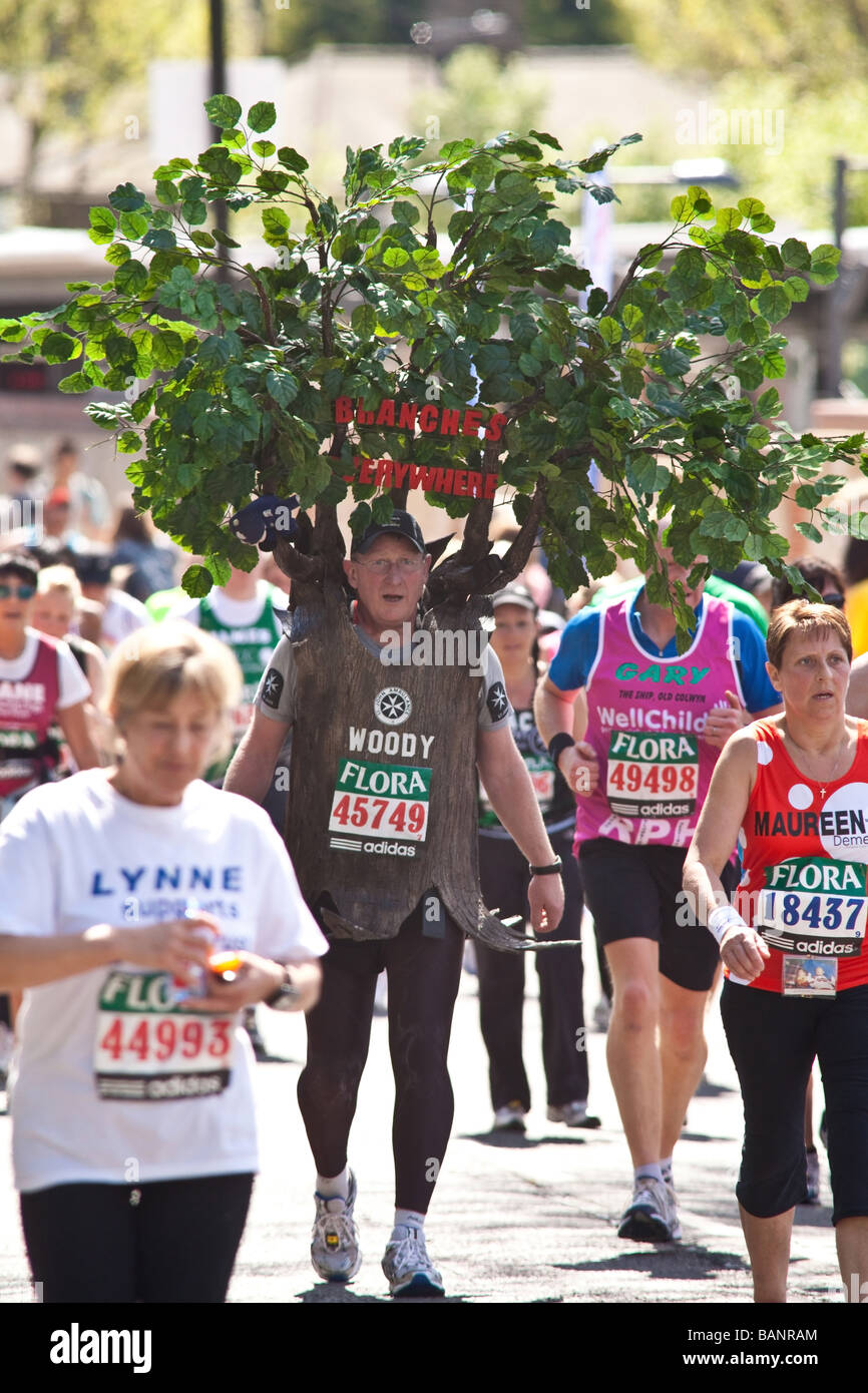 Fancy dress runner, dressed as a tree on the Flora London Marathon 2009 ...