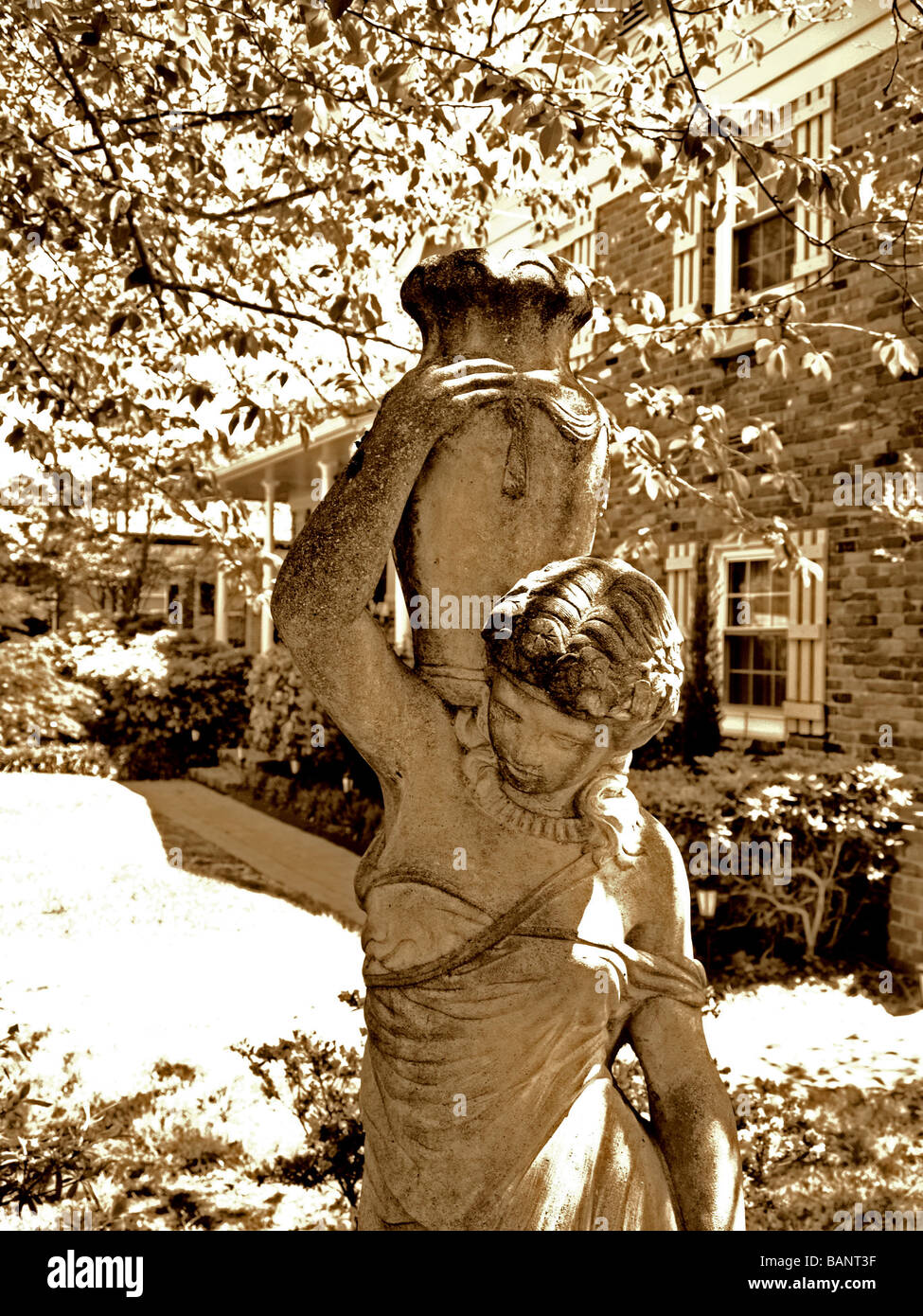 yard statue of women holding vase with Greek or Roman feel stone ...