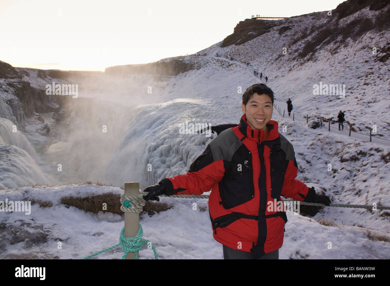 Chinese man standing on remote ice field Stock Photo - Alamy