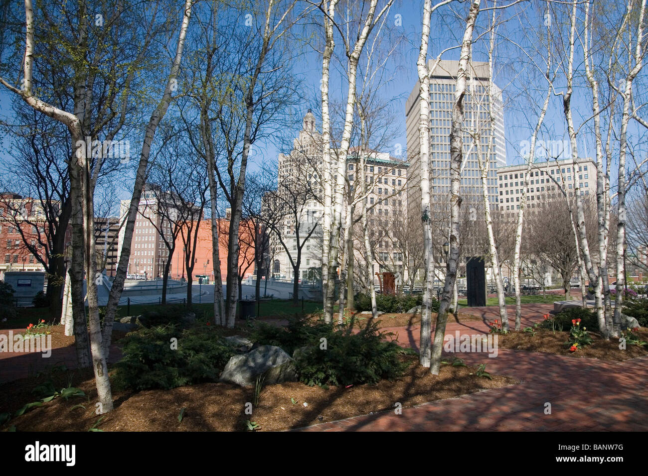 Spring time photo of park with city buildings in the background Stock ...