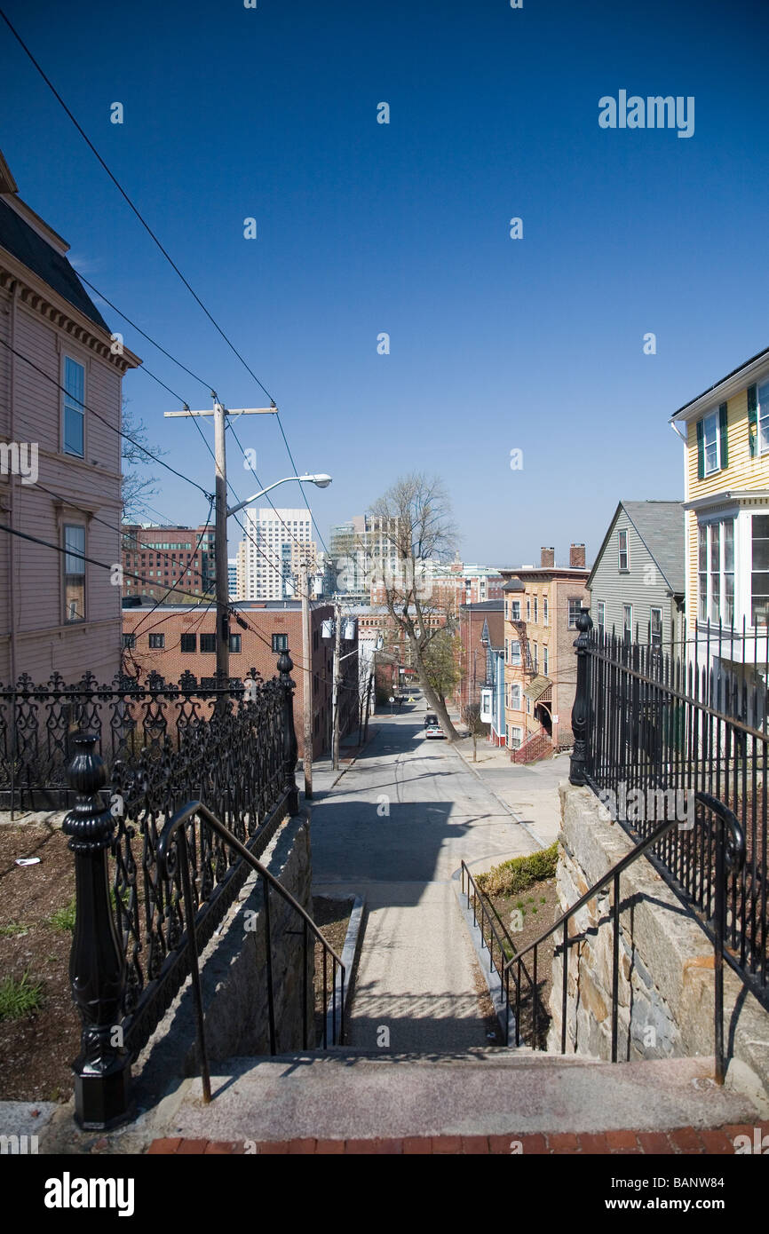 Sidewalk and stairs leading down to a side street Stock Photo - Alamy