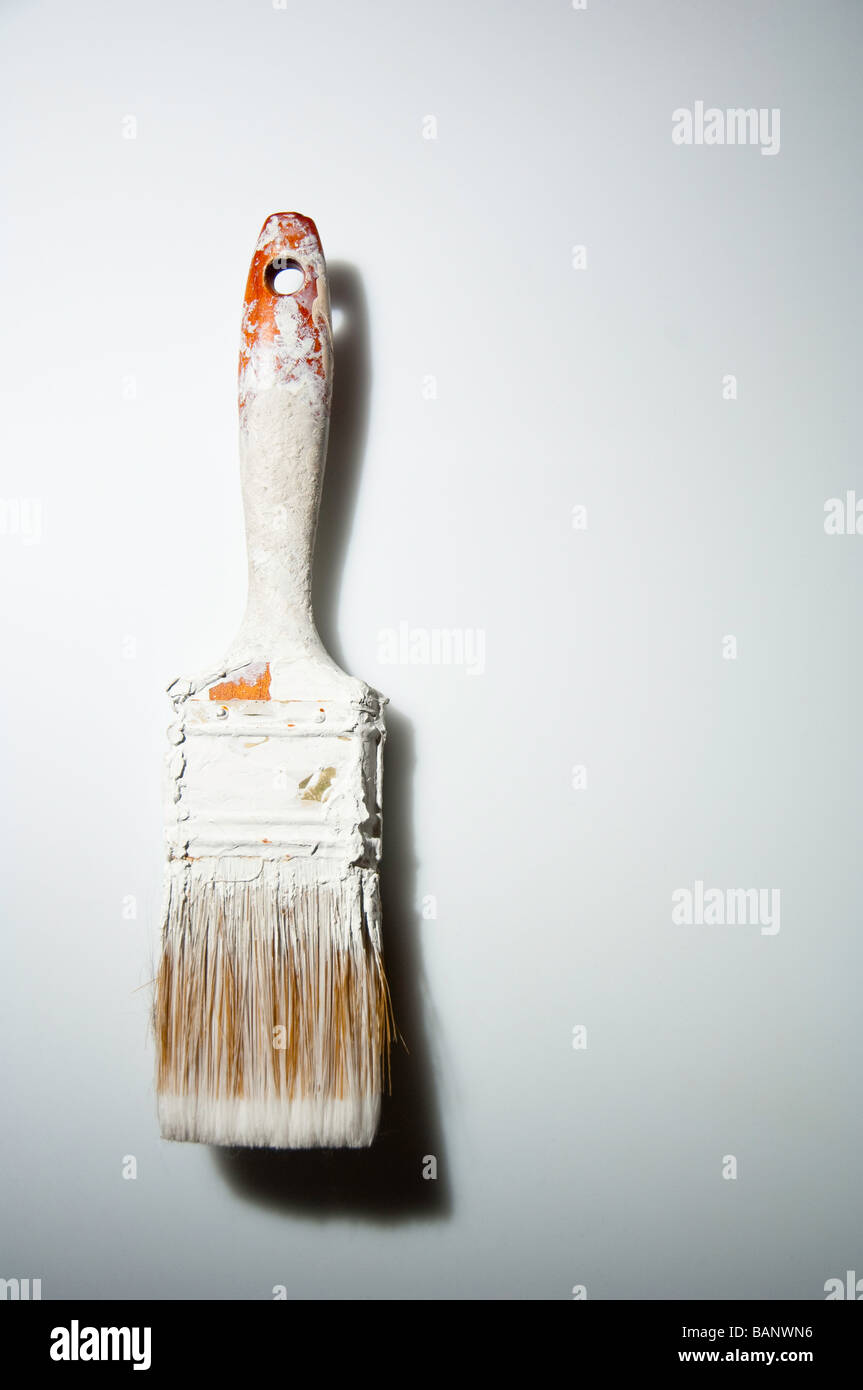 Old paint brush under spotlight Stock Photo - Alamy