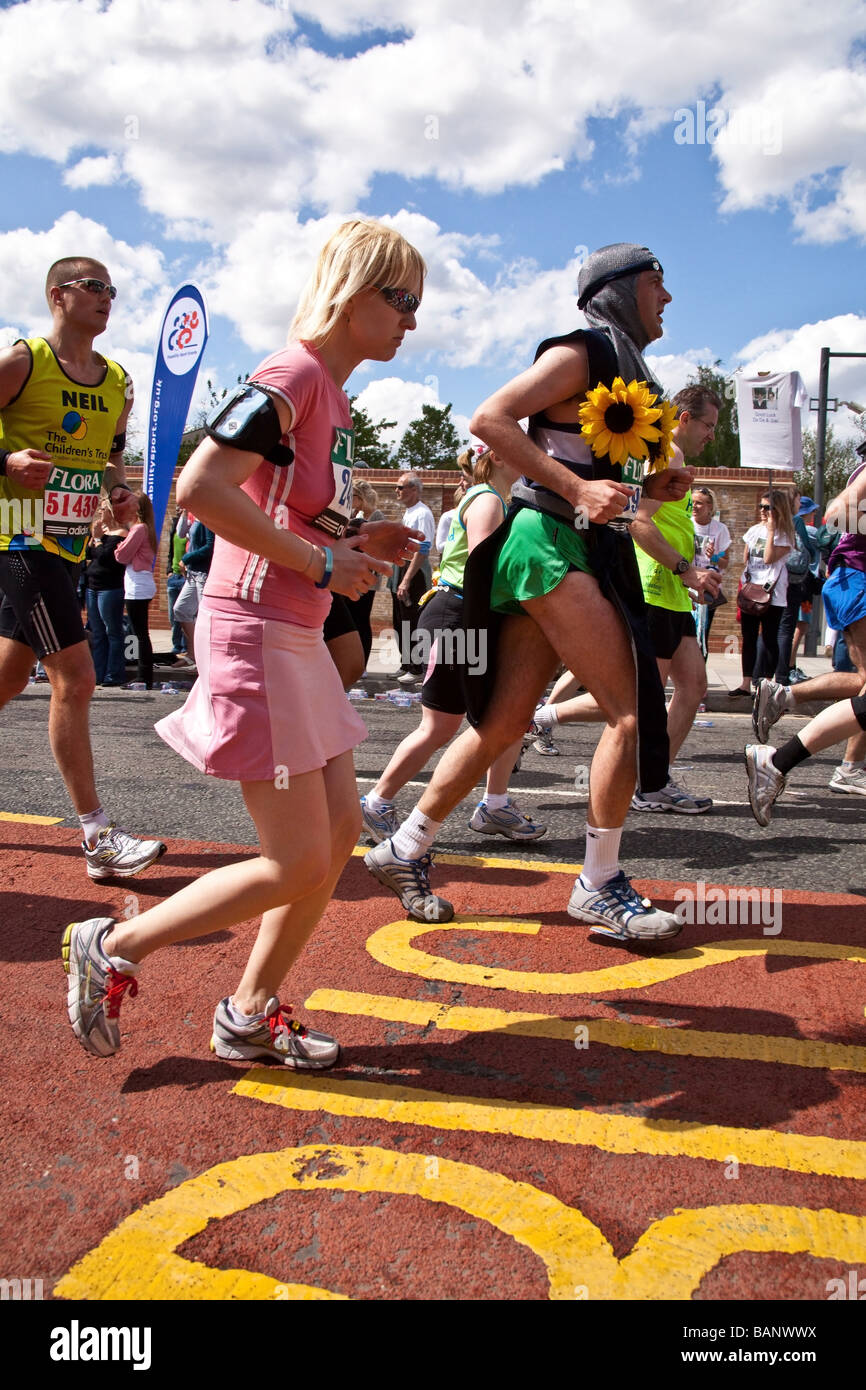 Fancy dress Athletes running the Flora London Marathon 2009 at Mudchute ...
