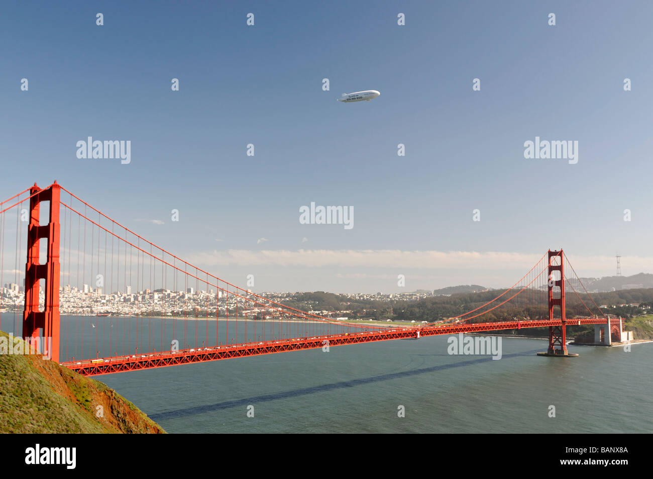 The golden gate bridge san francisco with an airship blimp flying ...