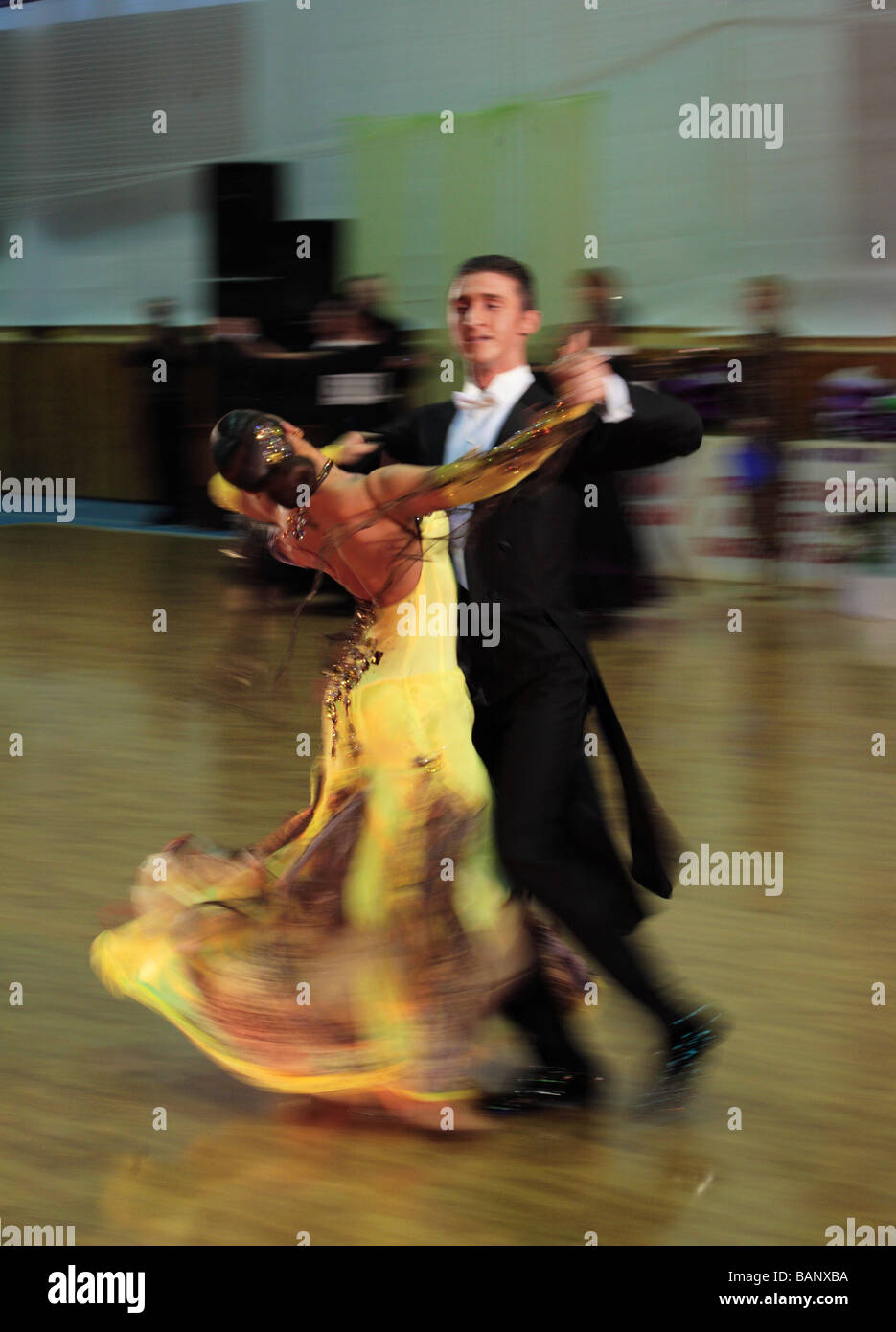 Professional ballroom dancers performing in the Standard Dance ...