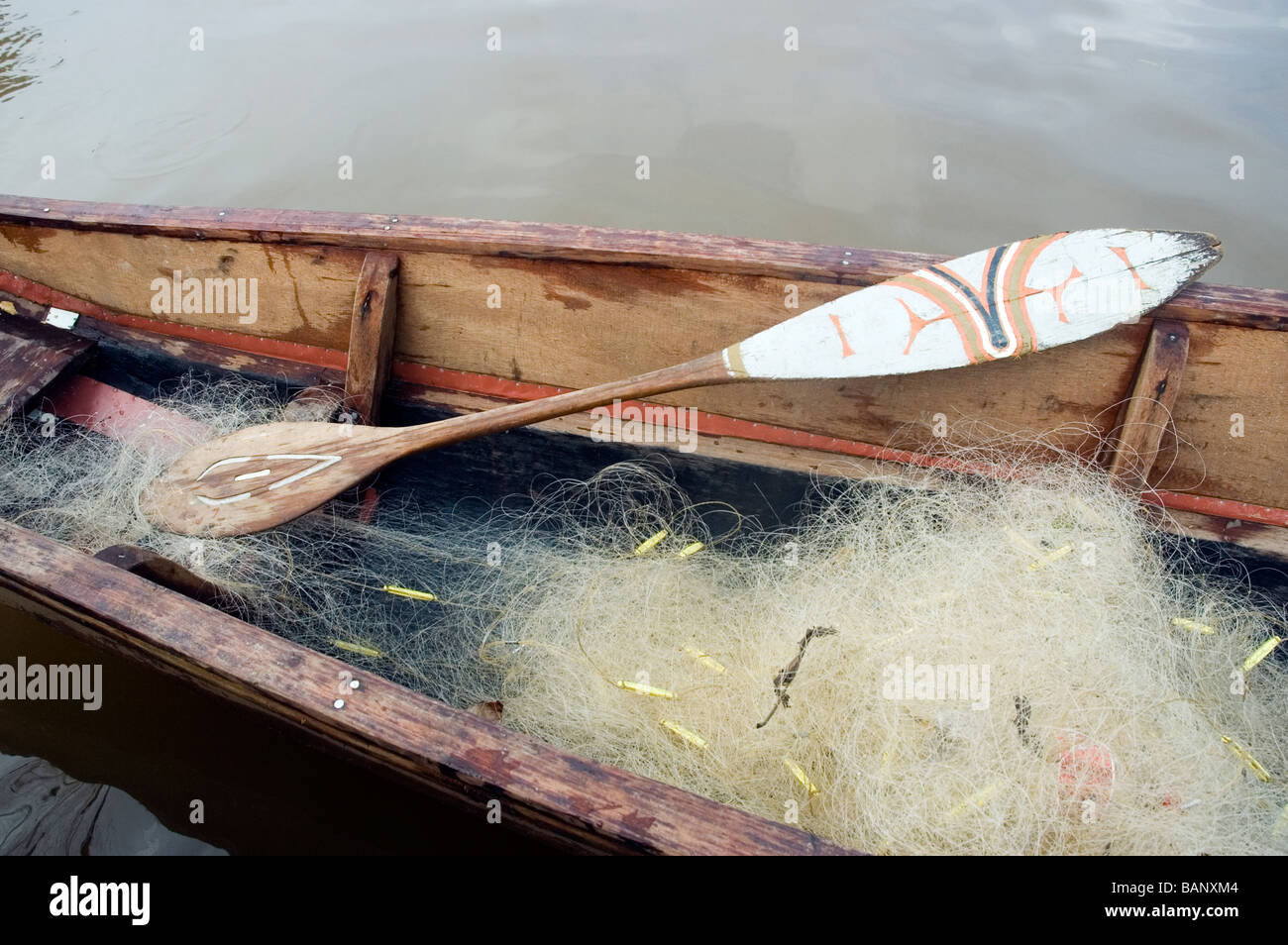 maroon pirogue and paddle on the Maroni river Stock Photo - Alamy