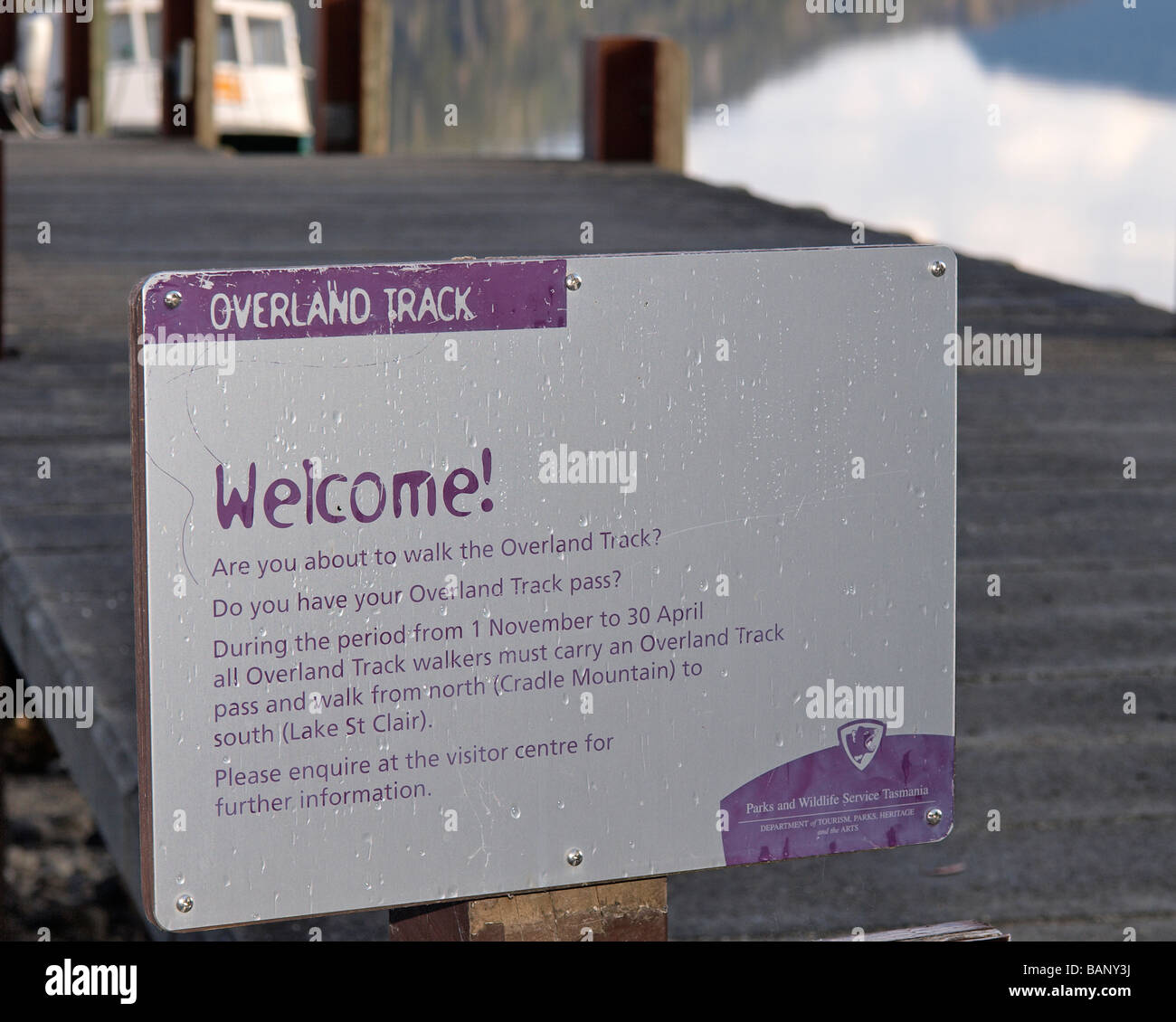 OVERLAND TRACK SIGN NEAR JETTY ON LAKE ST CLAIR TASMANIA AUSTRALIA ...