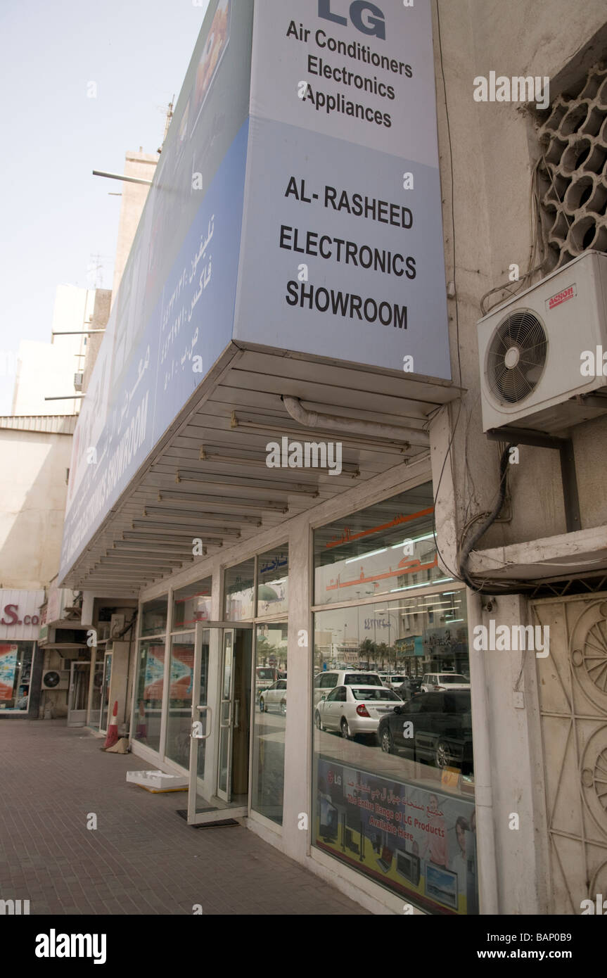 arabic shop frontage with reflection of passing traffic in the windows ...