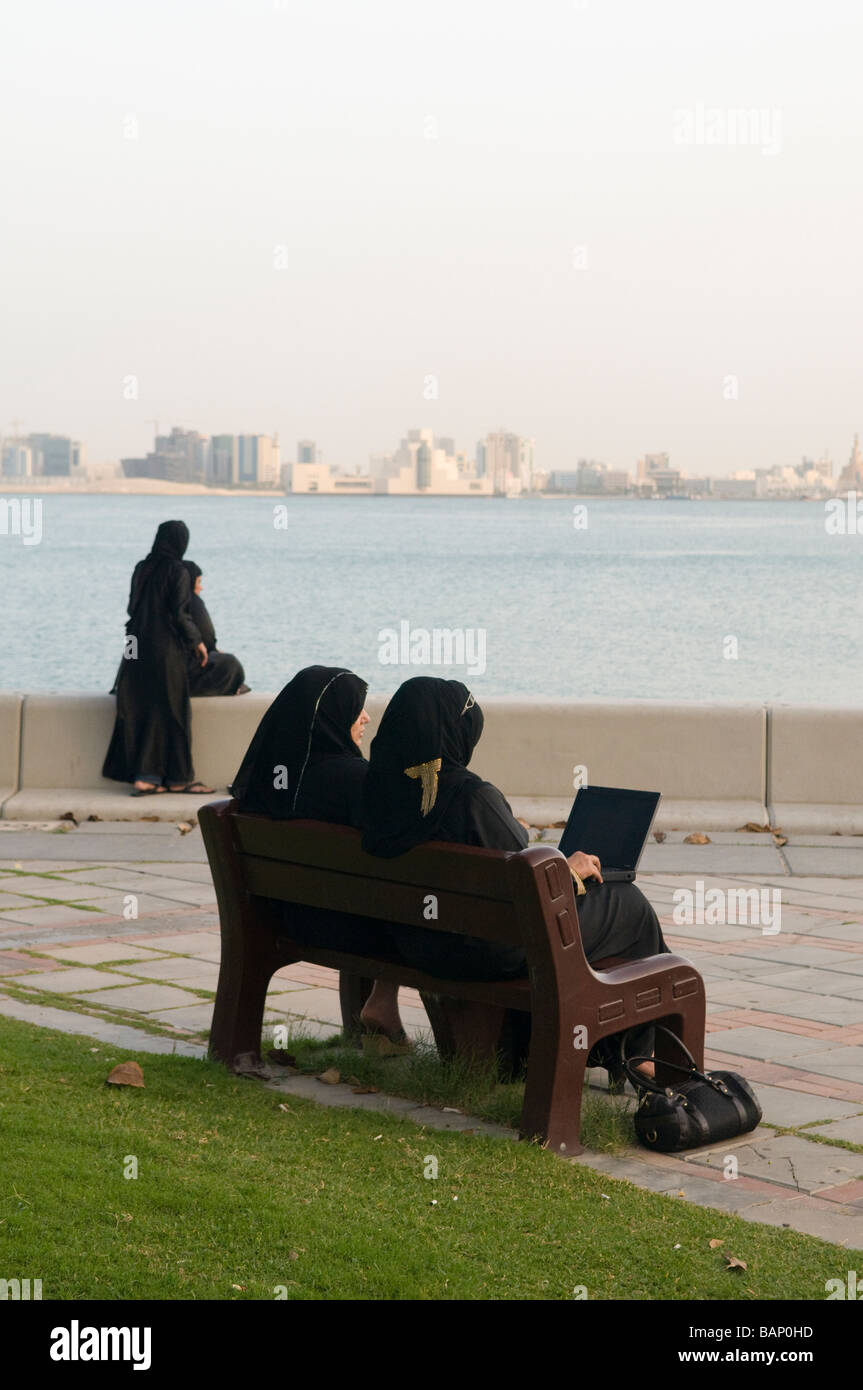 Two ]Arabic women wearing the traditional clothing of and Abaya and ...