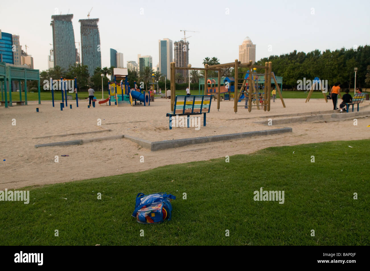 Children in qatar swings hi-res stock photography and images - Alamy