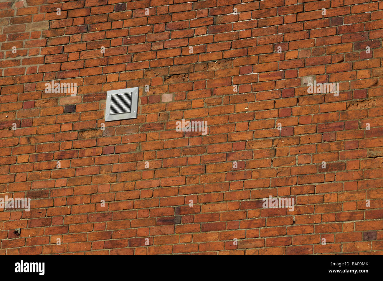 extractor fan vent in a brick wall Stock Photo - Alamy