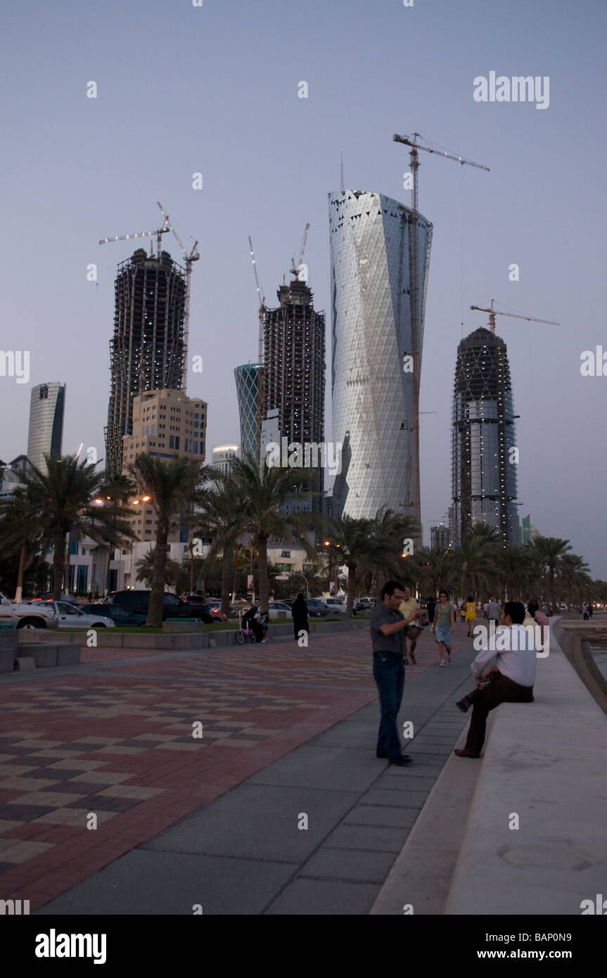 financial buildings at sunset on the corniche in Doha Qatar Stock Photo ...